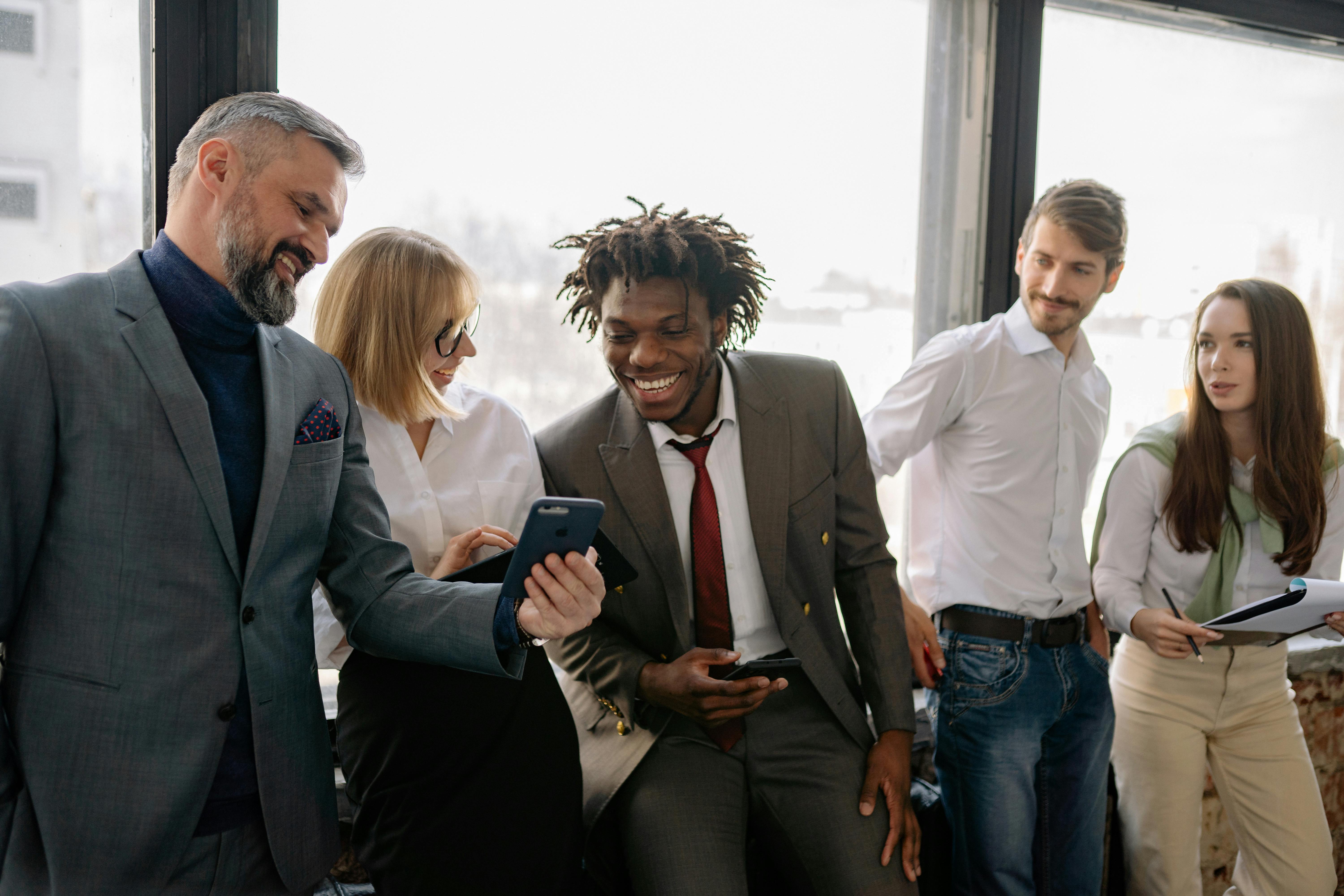 Office Team Standing in the Room · Free Stock Photo