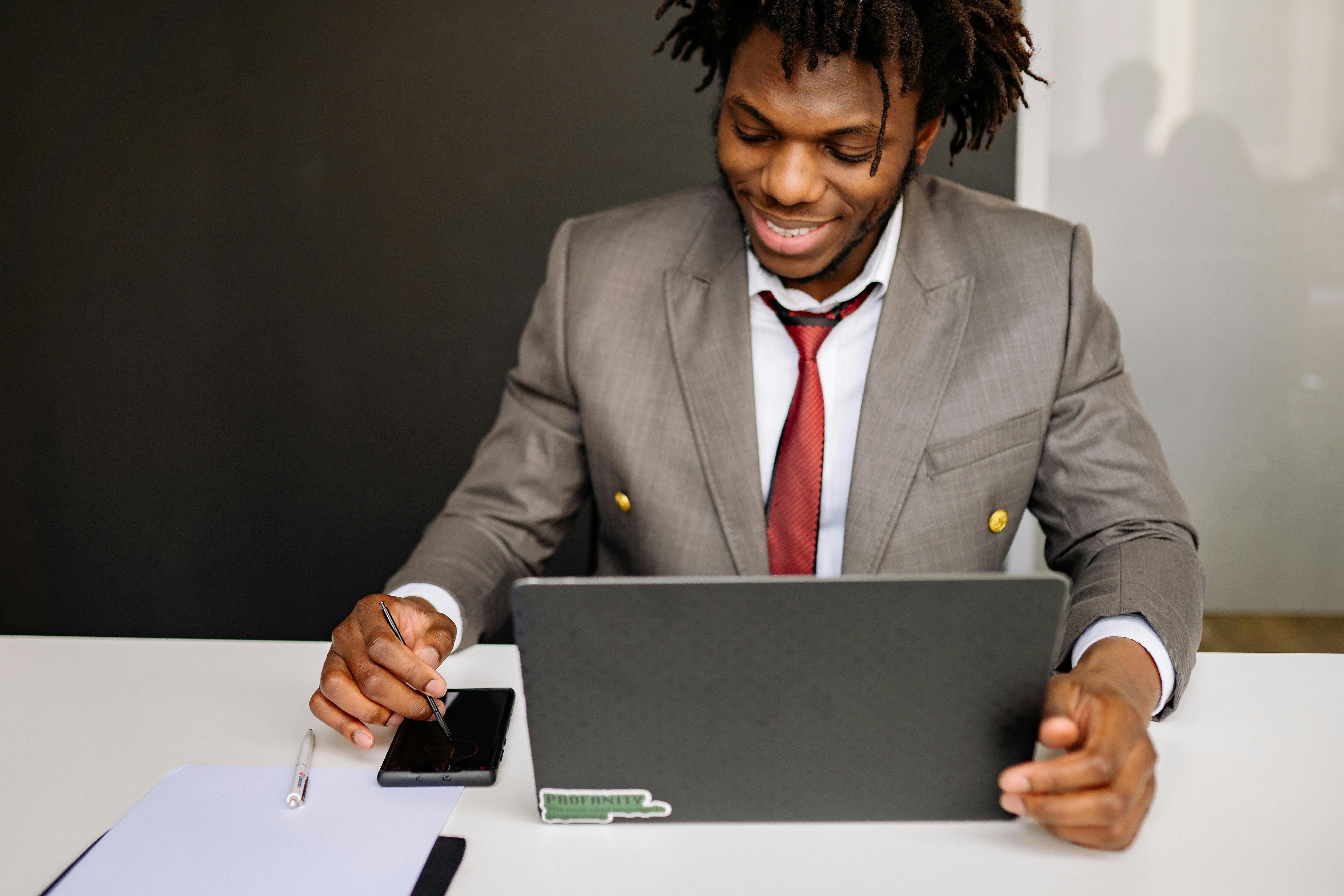 Man in the Office Using a Scanner · Free Stock Photo