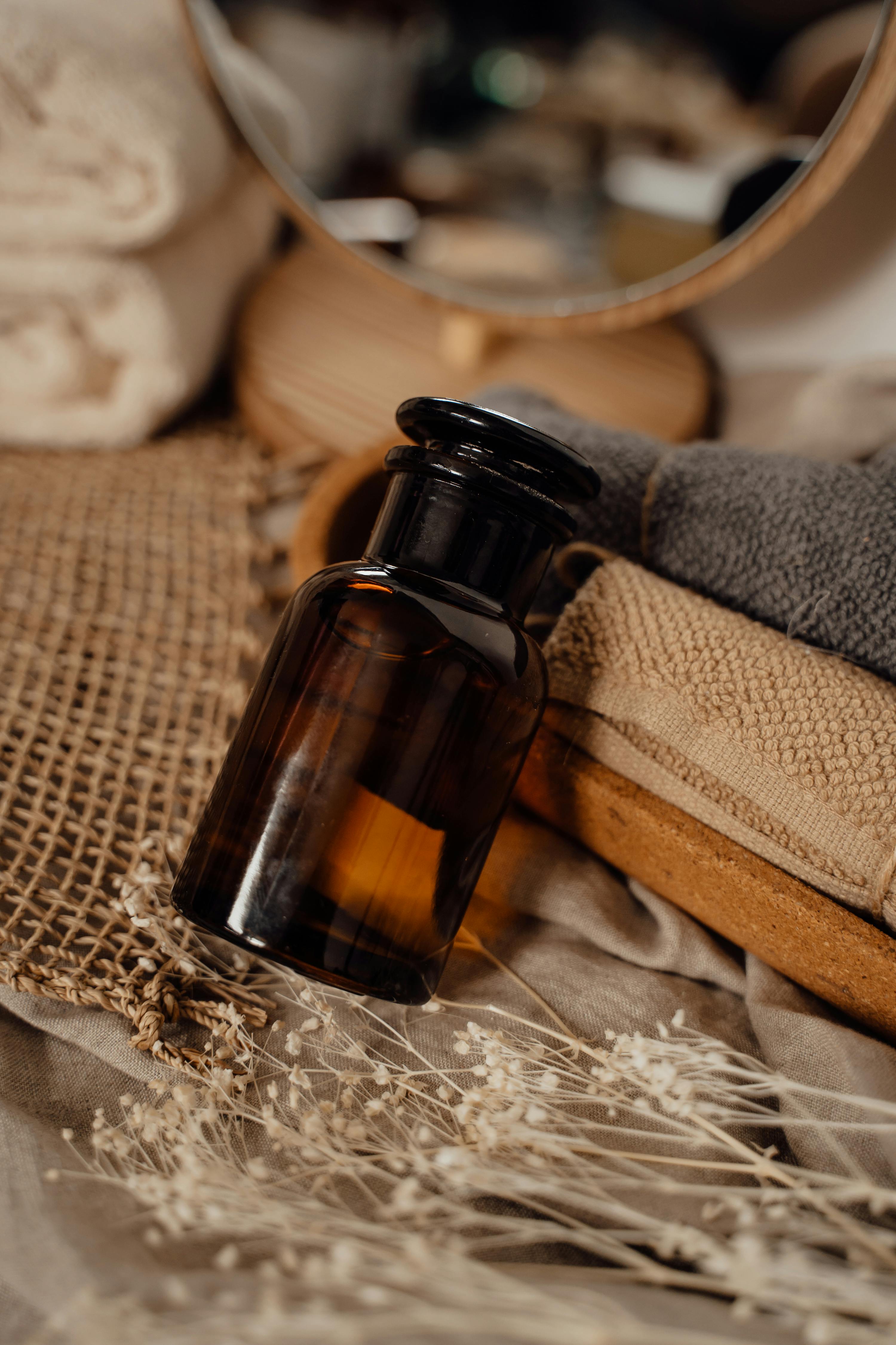 Aromatherapy Product in Brown Glass Bottle · Free Stock Photo