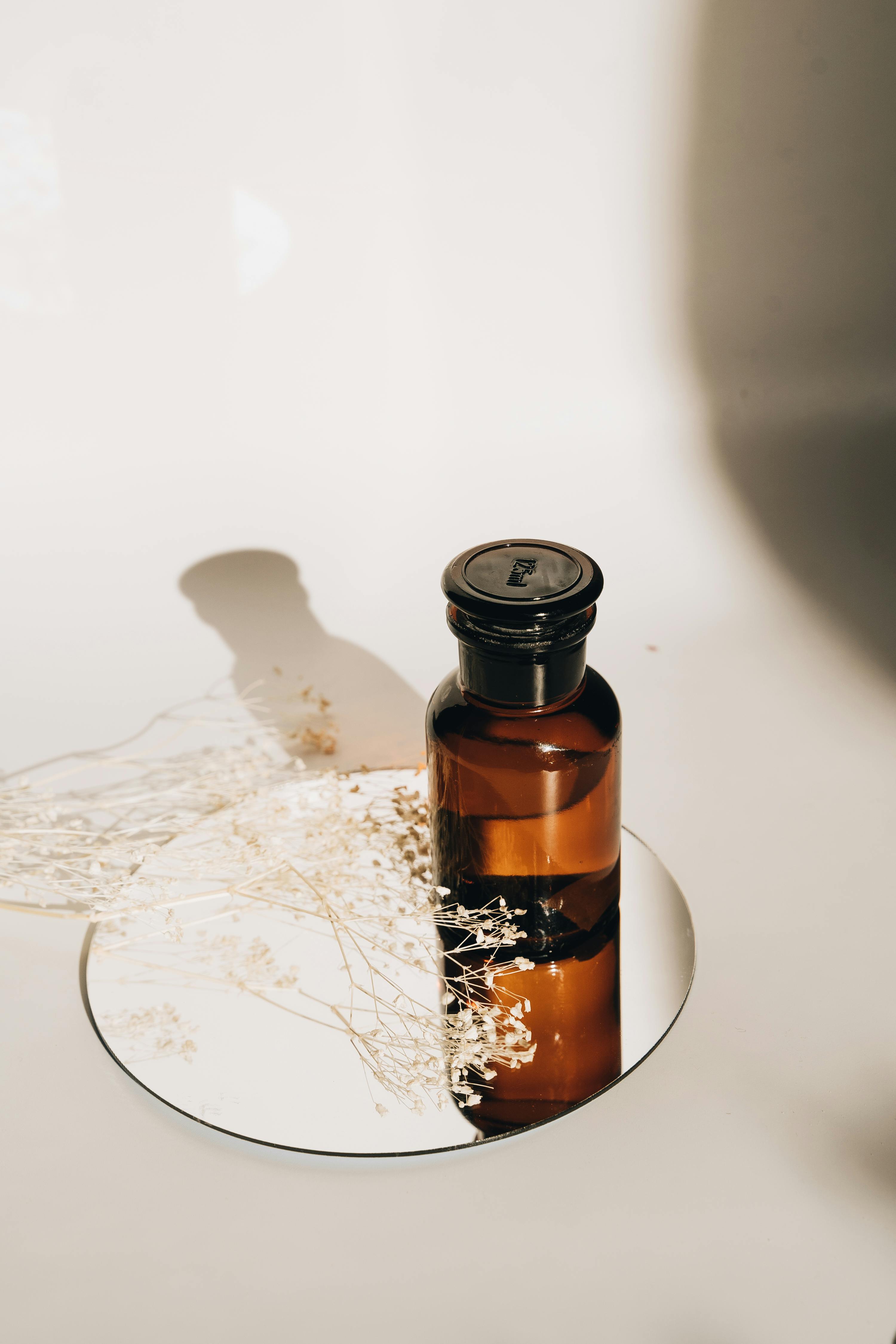 Brown Glass Bottle with Massage Oil · Free Stock Photo