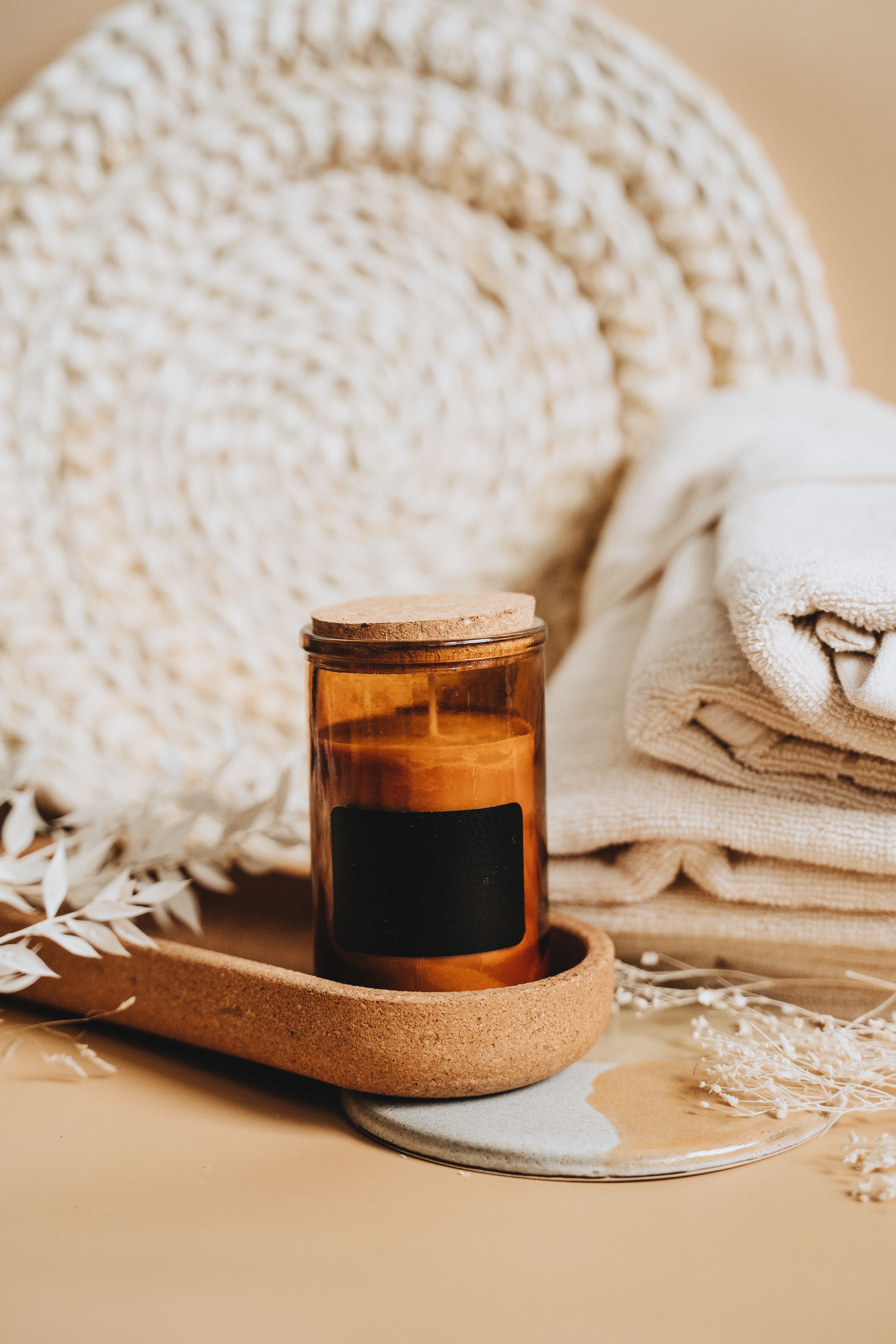 Spa Products and Lighted Candles on Sink Countertop · Free Stock Photo