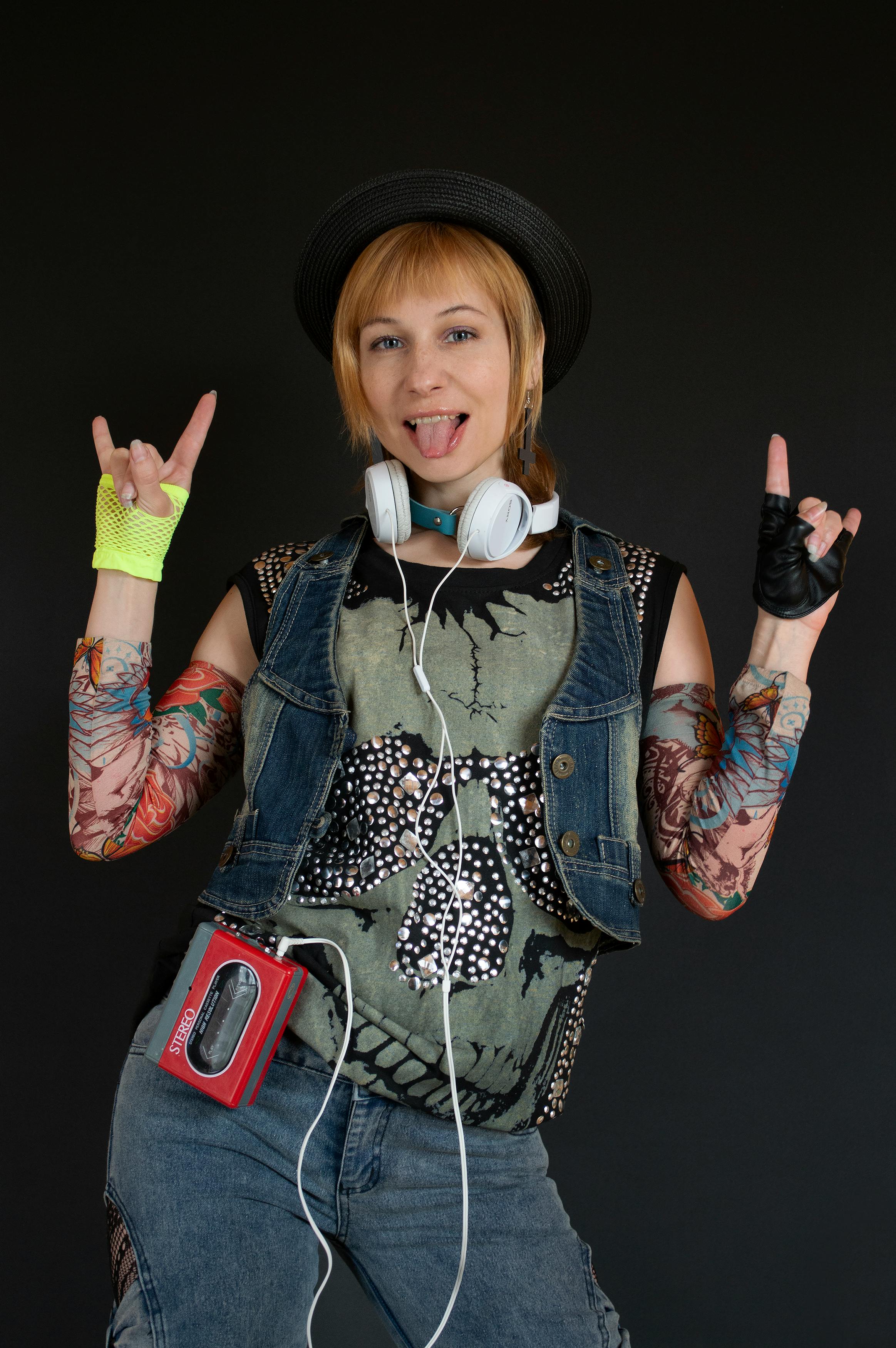 Punk Woman Posing with her Tongue Out · Free Stock Photo