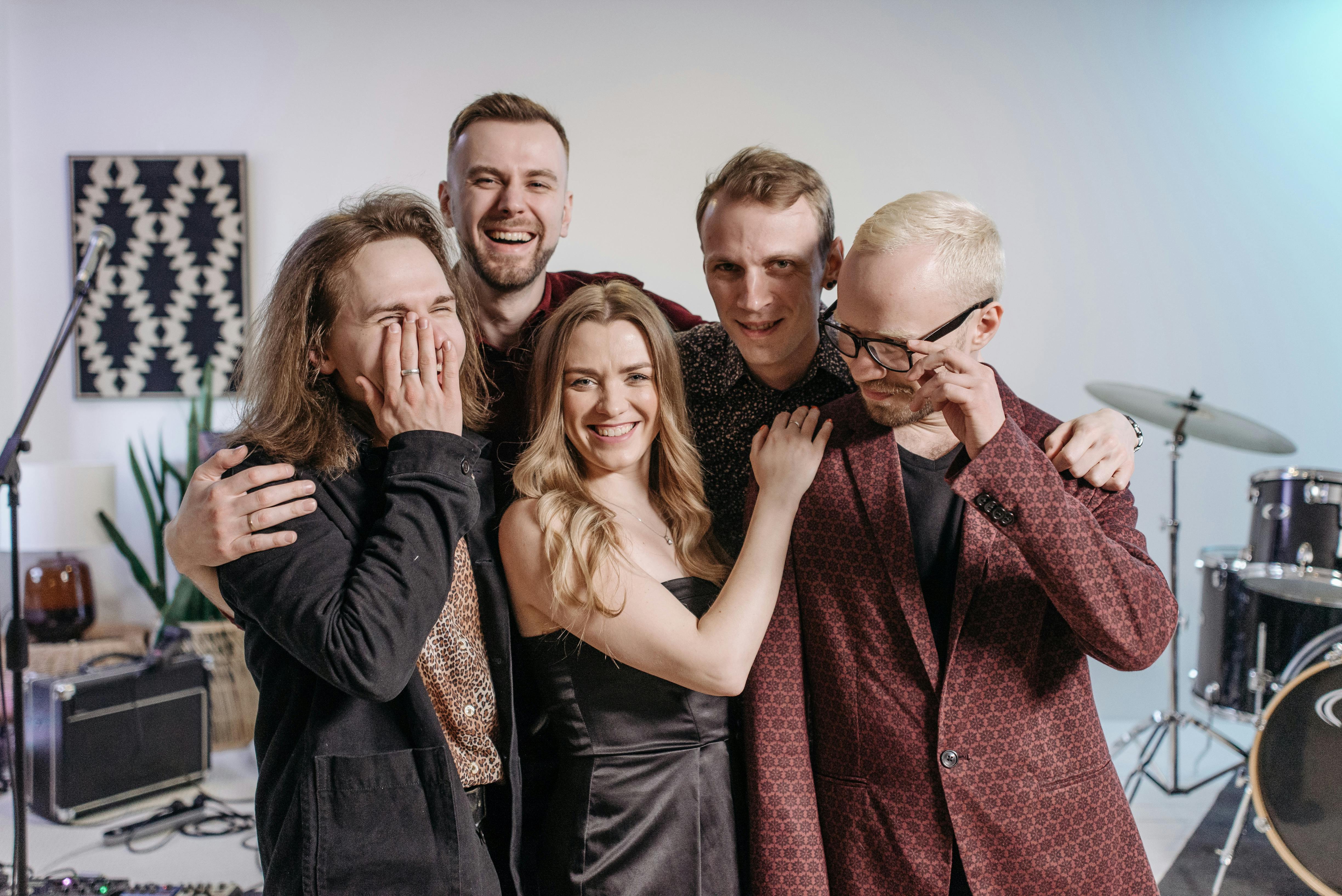 Happy People Standing Close Together · Free Stock Photo