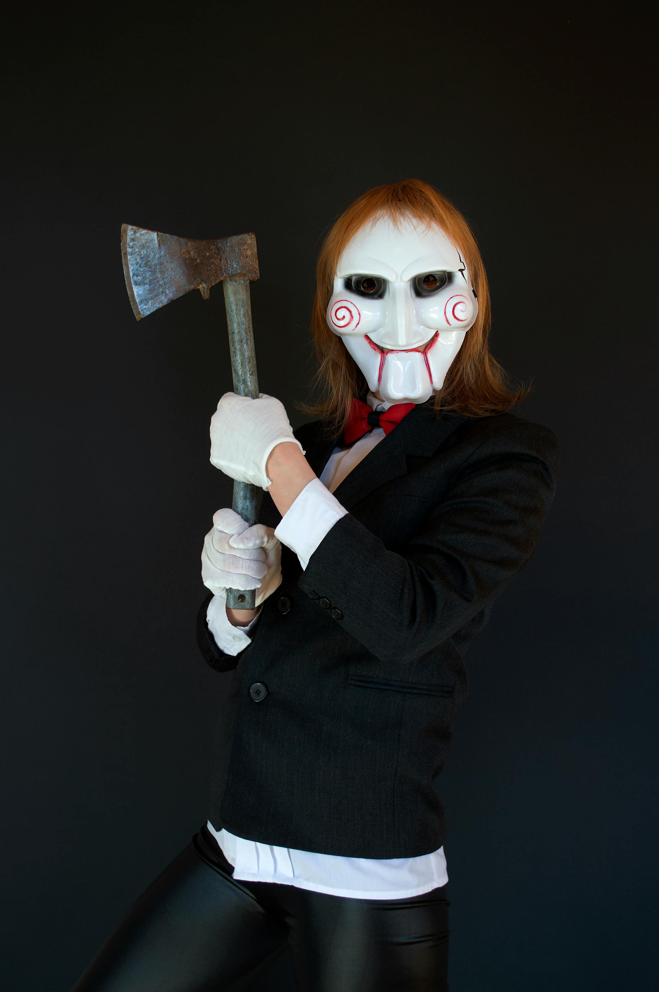Person Wearing a Costume Holding a Axe · Free Stock Photo