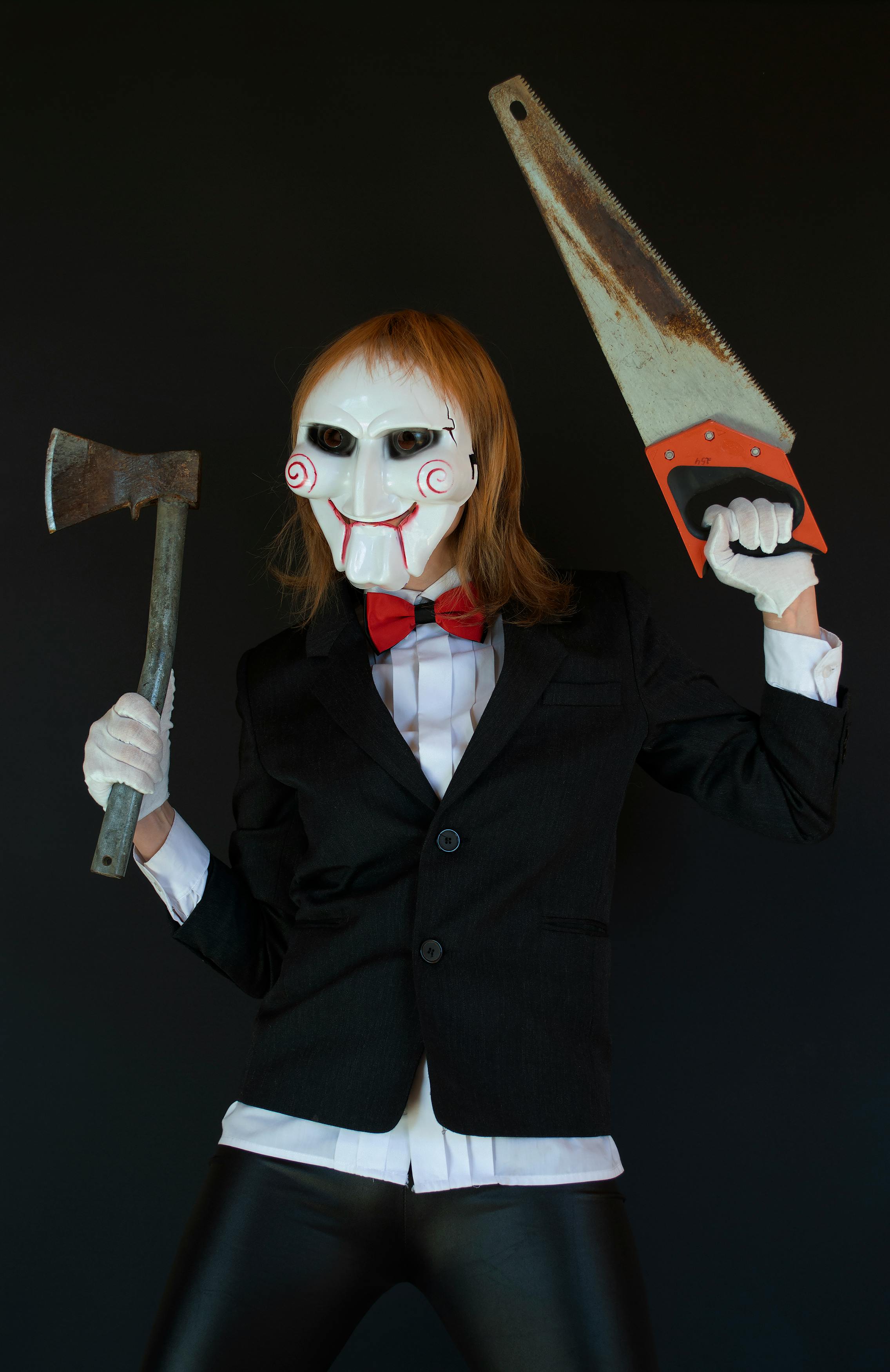 Person Wearing a Costume Holding a Axe · Free Stock Photo