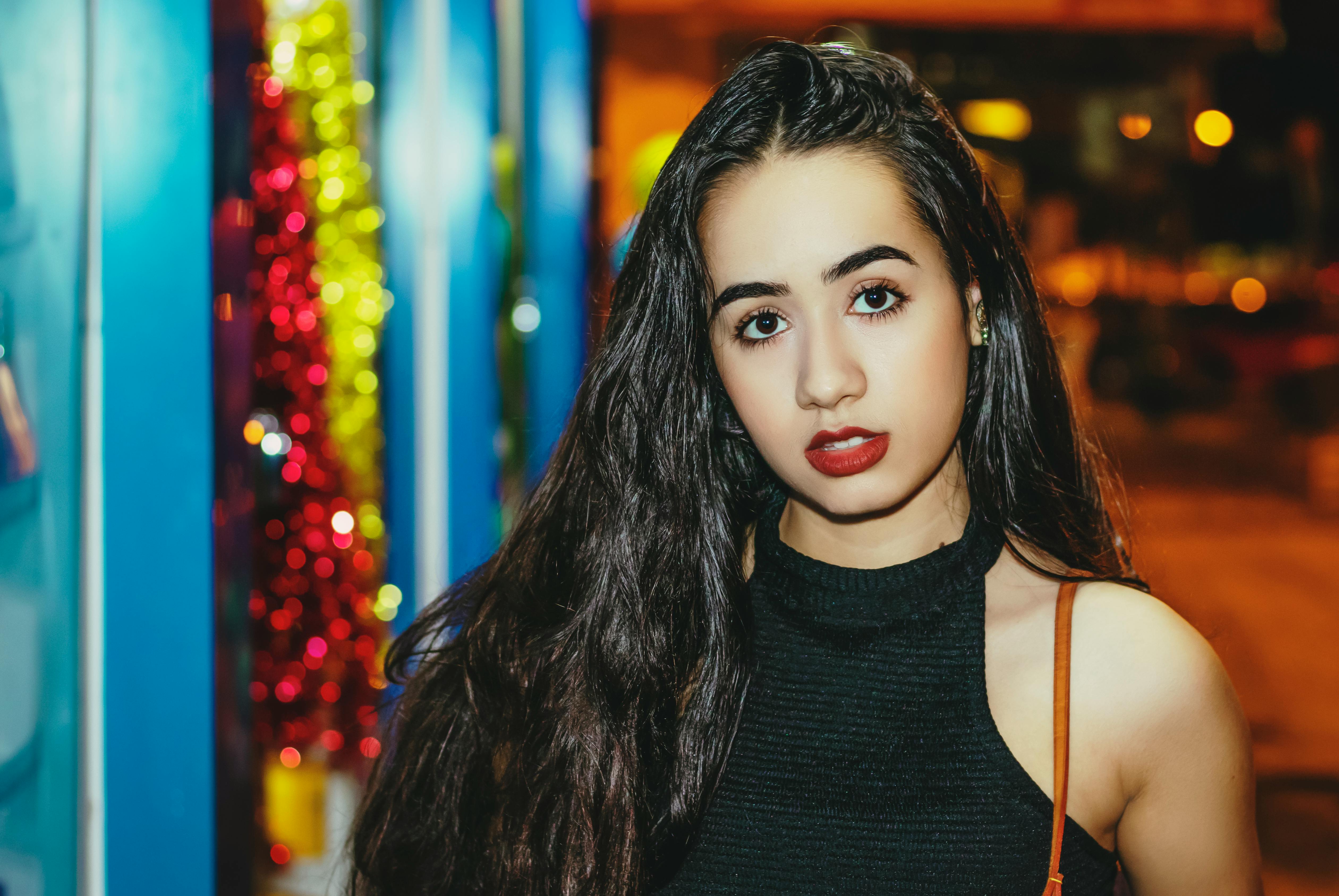 Young Woman with Long Brown Hair Smiling · Free Stock Photo