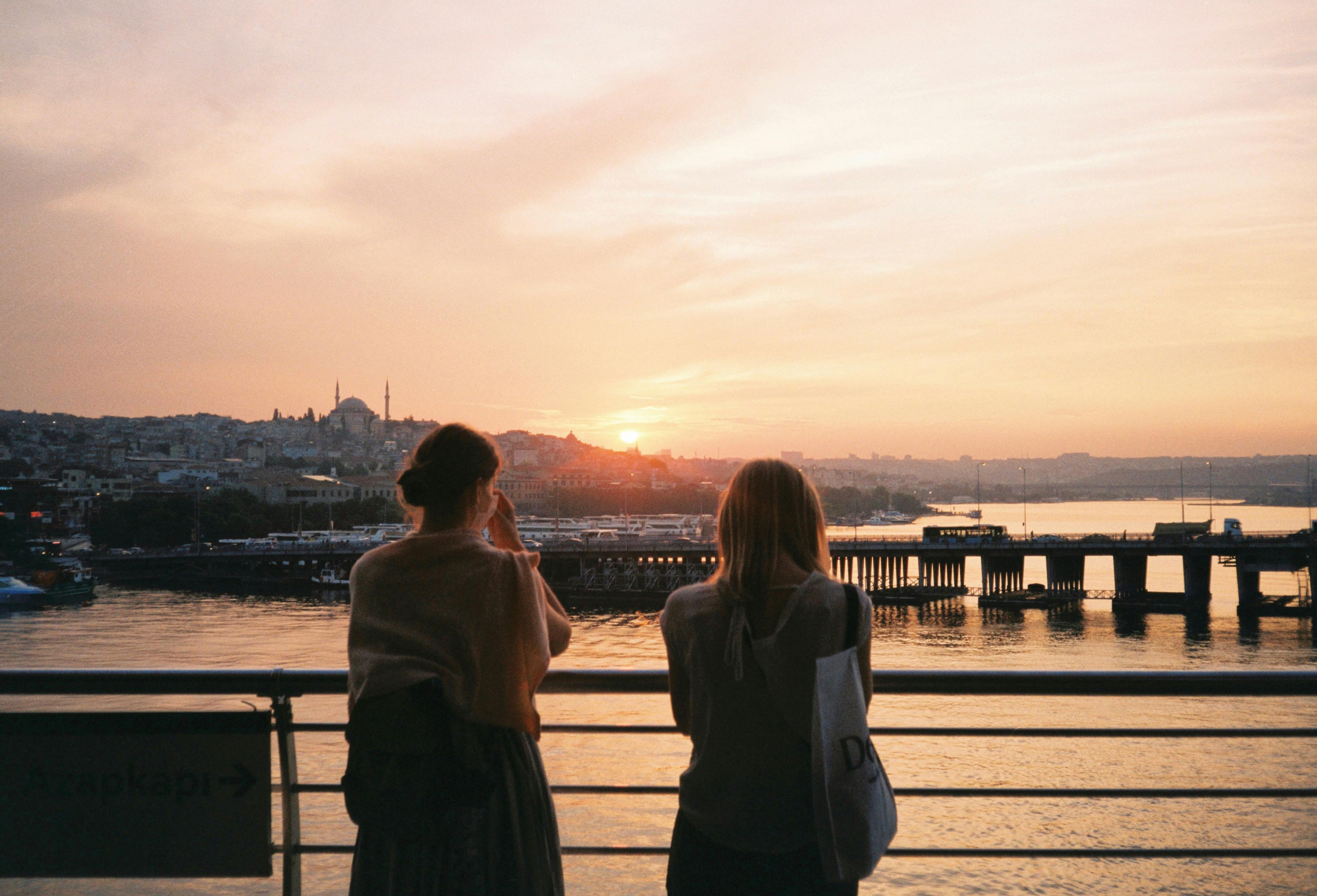 Woman Leaning against Railing · Free Stock Photo