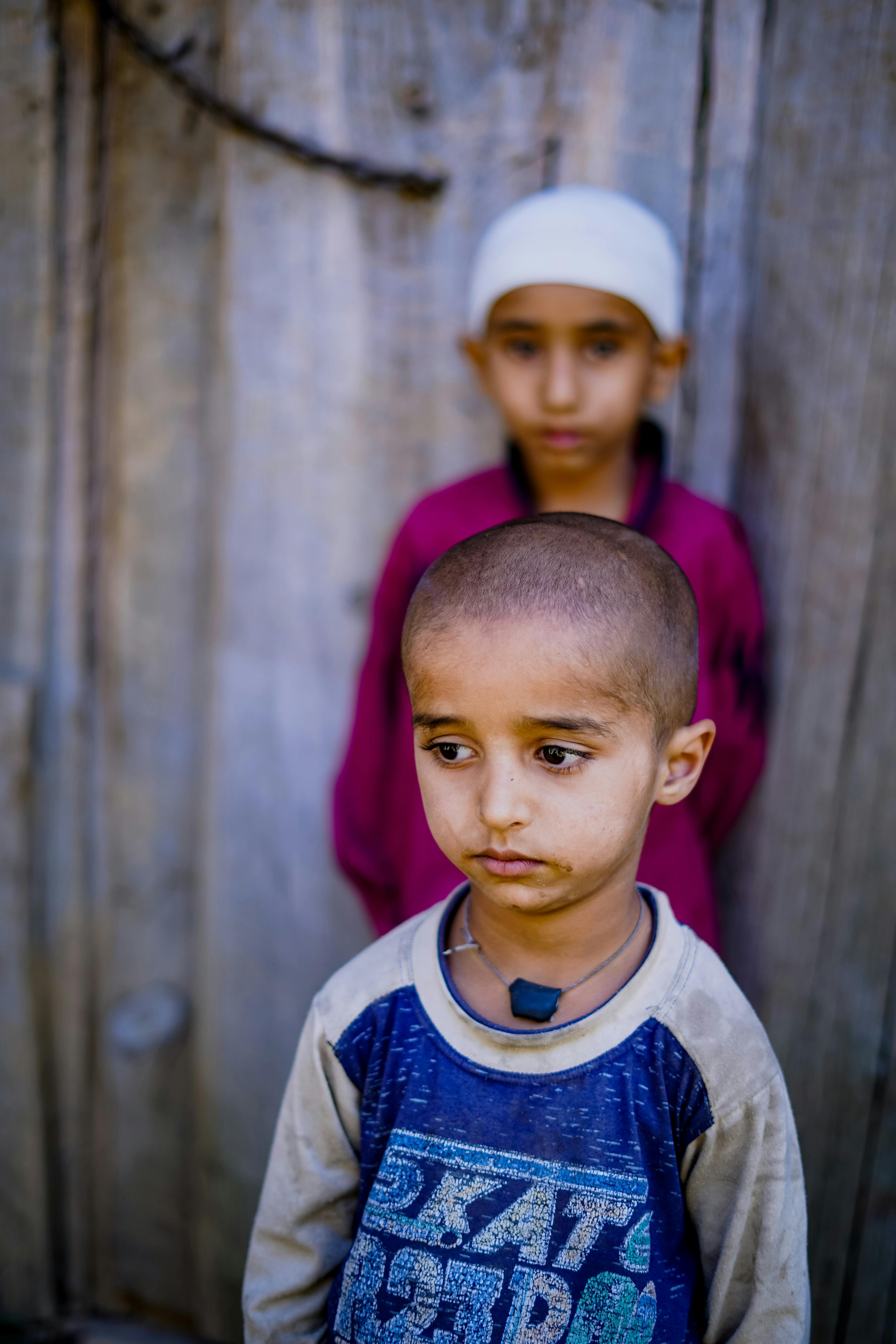 Red-haired Girl Standing Near Plant · Free Stock Photo