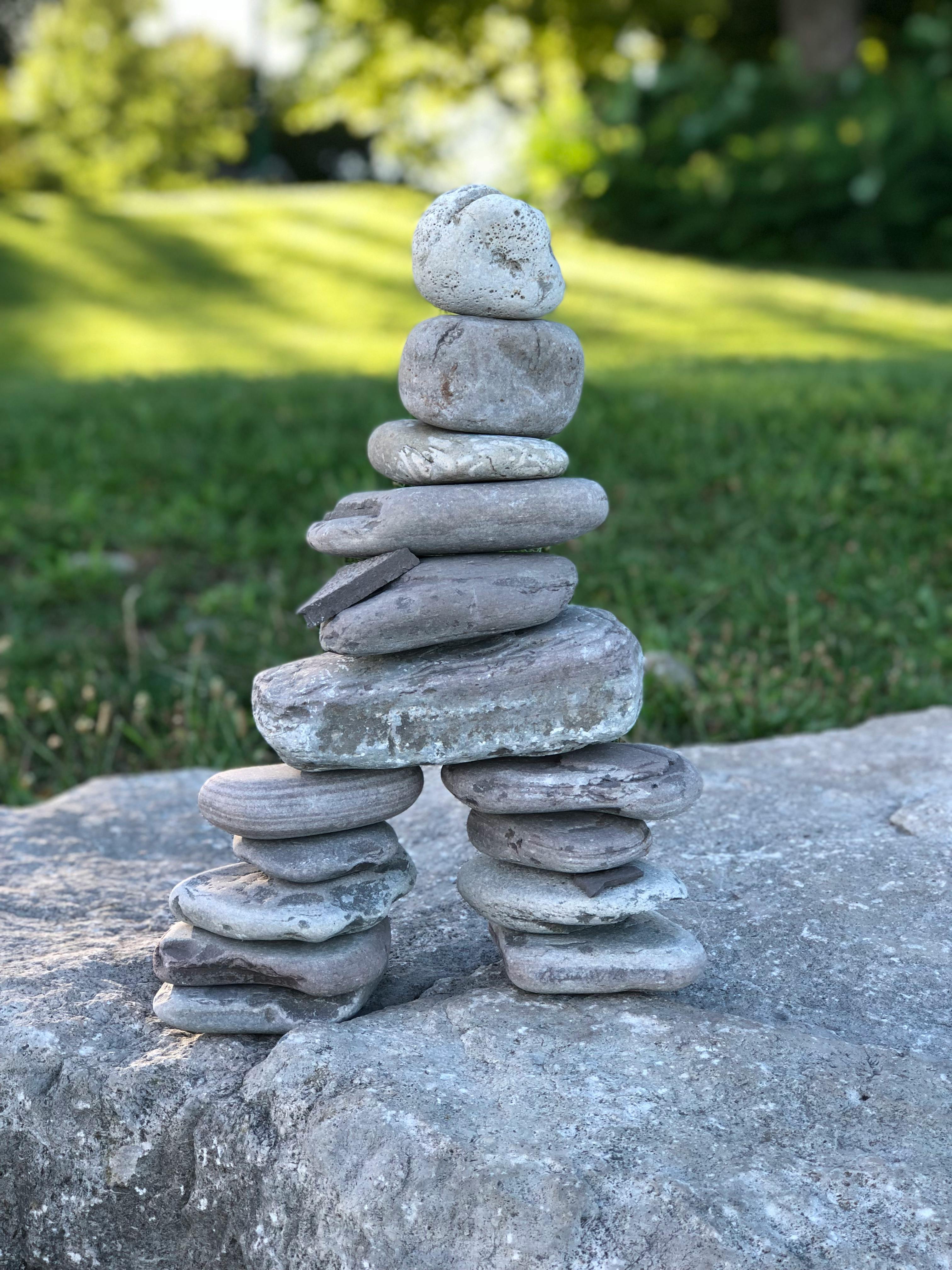 Gray Stone Stack on Green Grass · Free Stock Photo