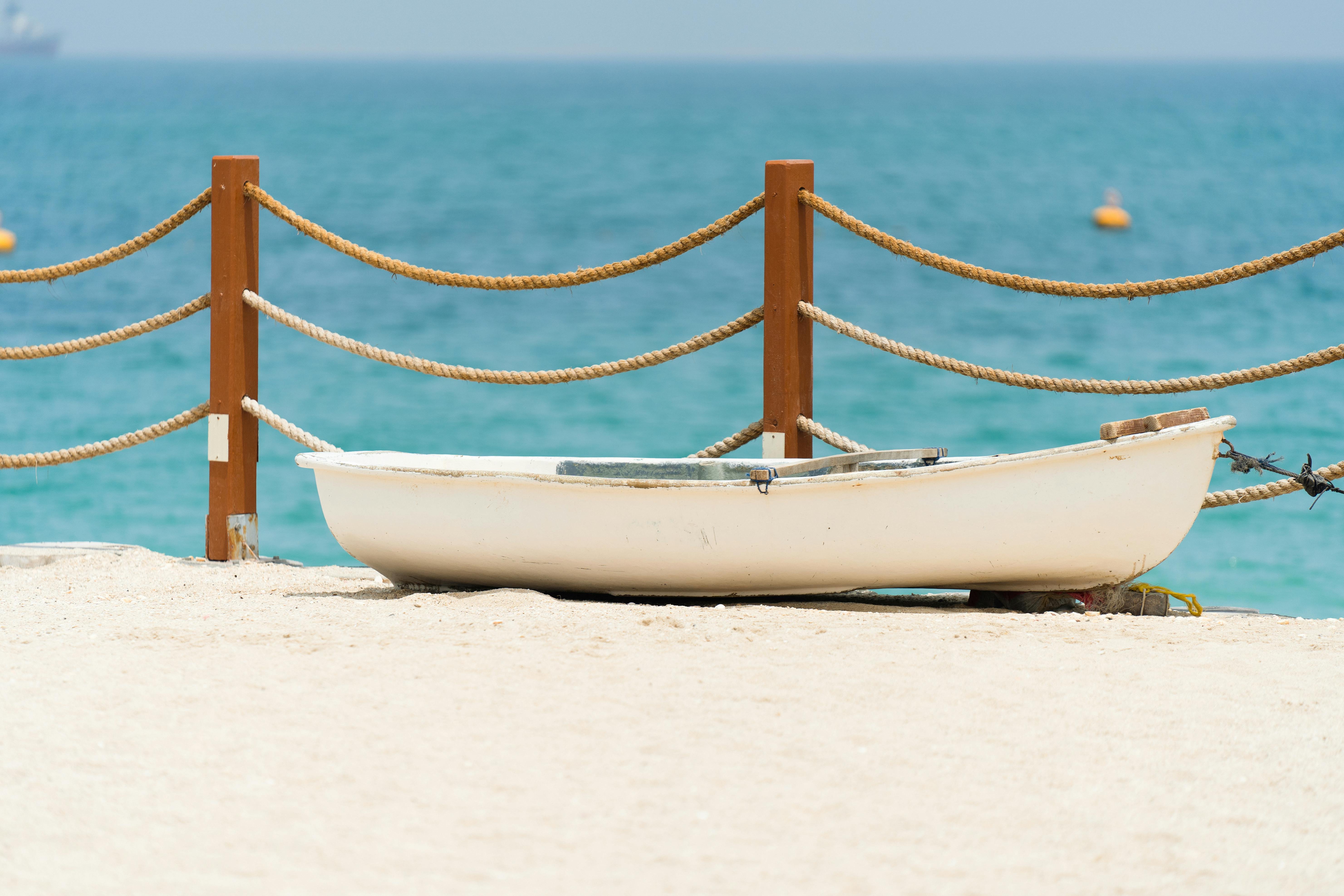 Photo of a White Boat on the Sand · Free Stock Photo