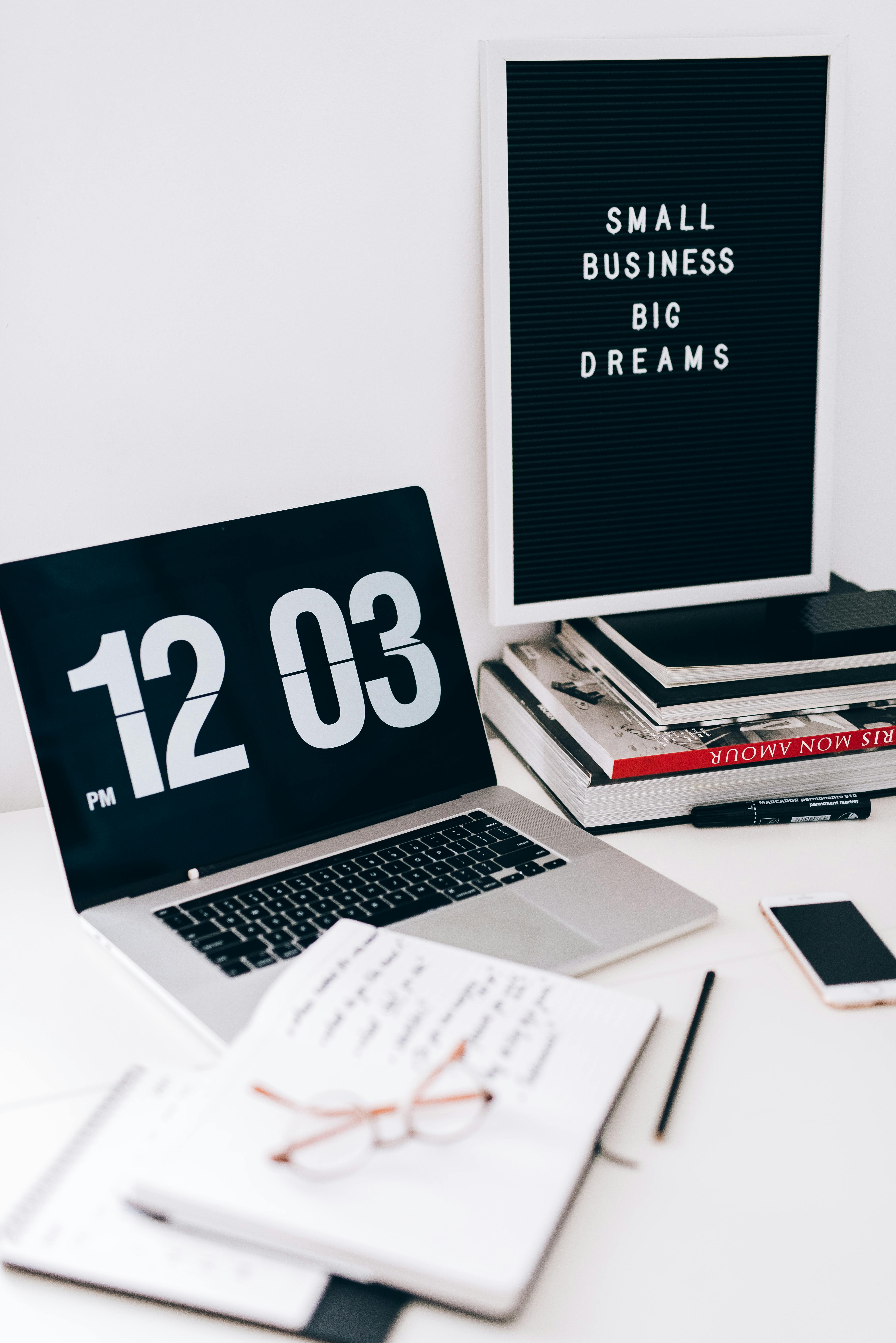 A Workspace with a Laptop and Letter Board · Free Stock Photo