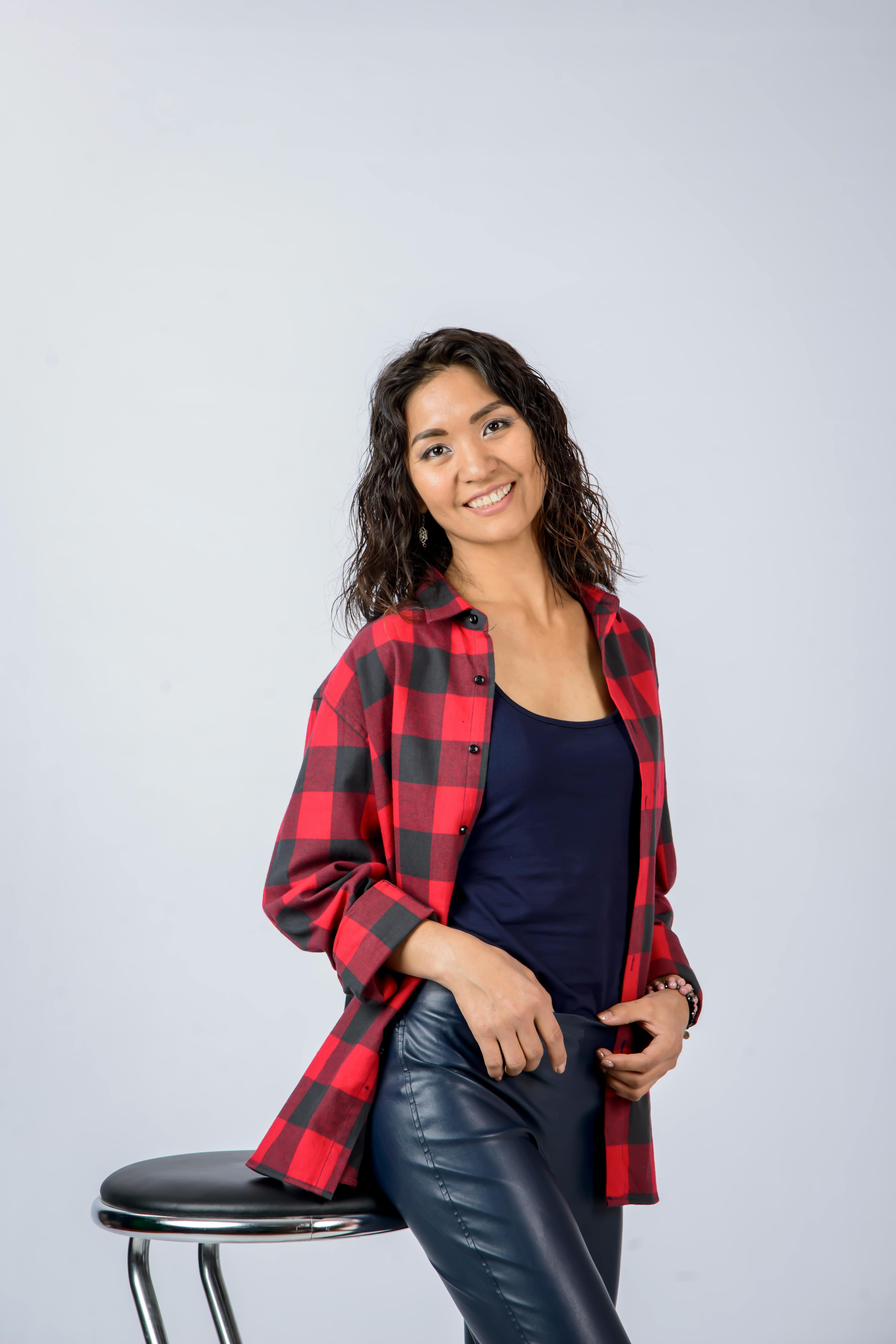Woman in Red Plaid Shirt Smiling at Camera · Free Stock Photo