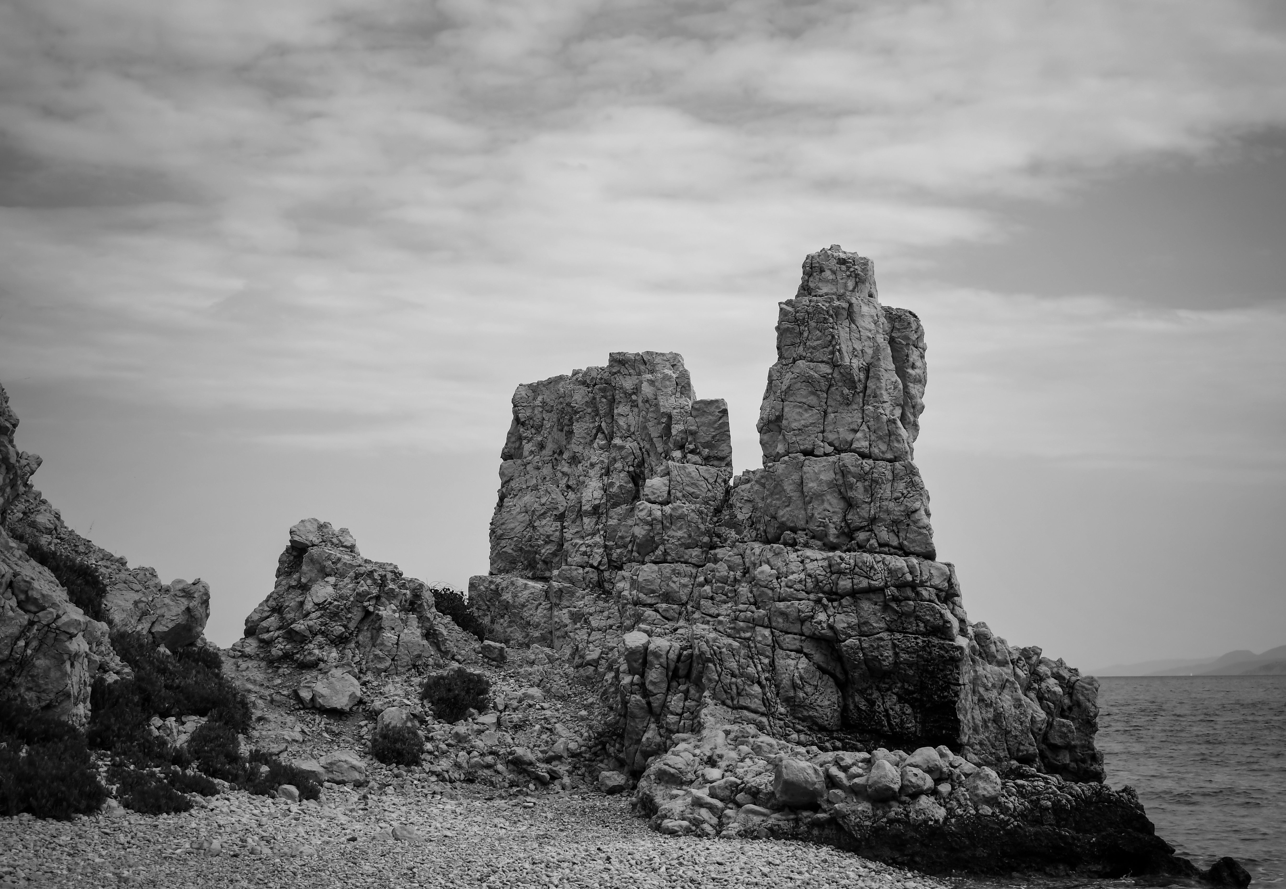 Grayscale Photo of Rock Formations · Free Stock Photo
