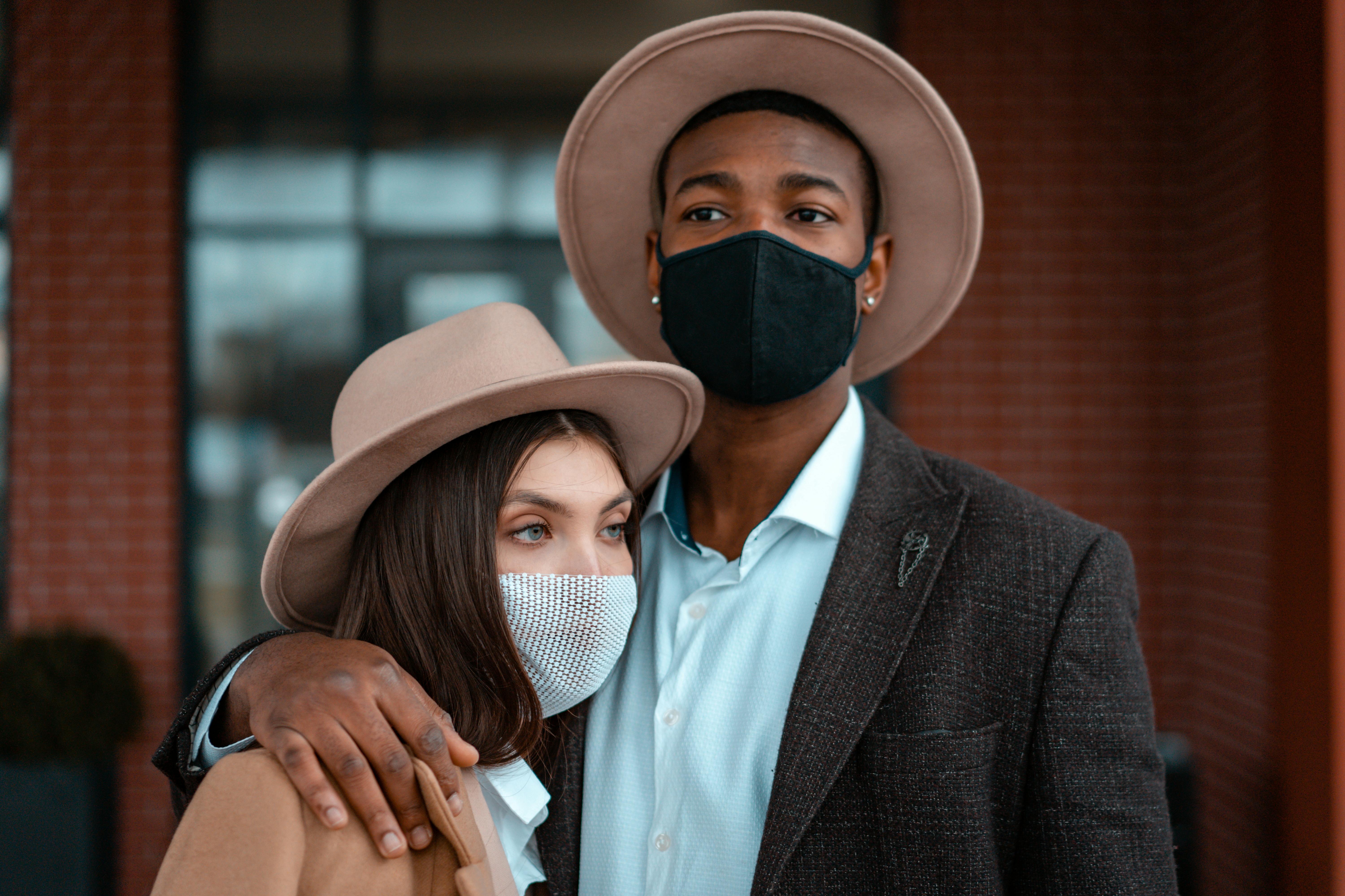 Couple Standing Close to Each Other Wearing Face Masks · Free Stock Photo