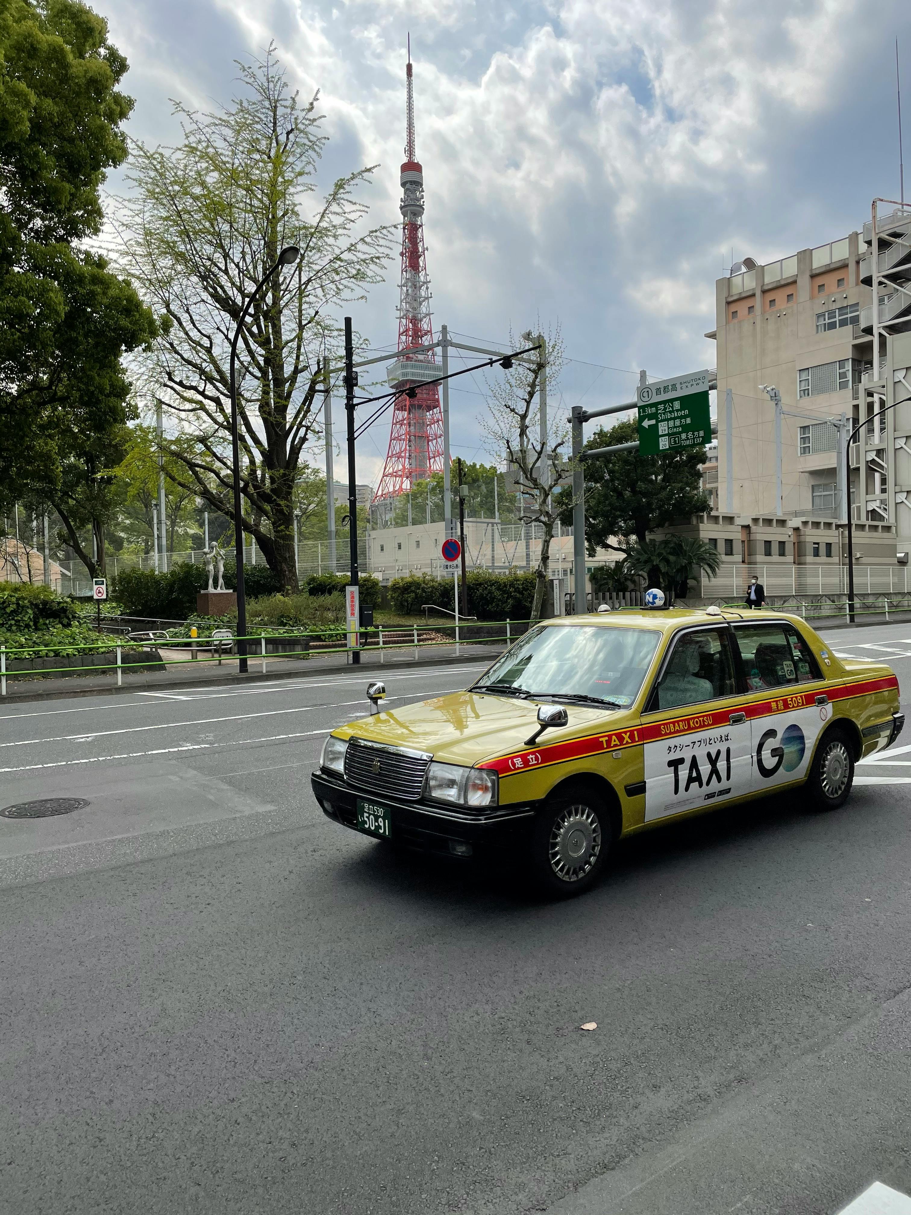 Yellow 5-door Hatchback Parked Near Trees · Free Stock Photo