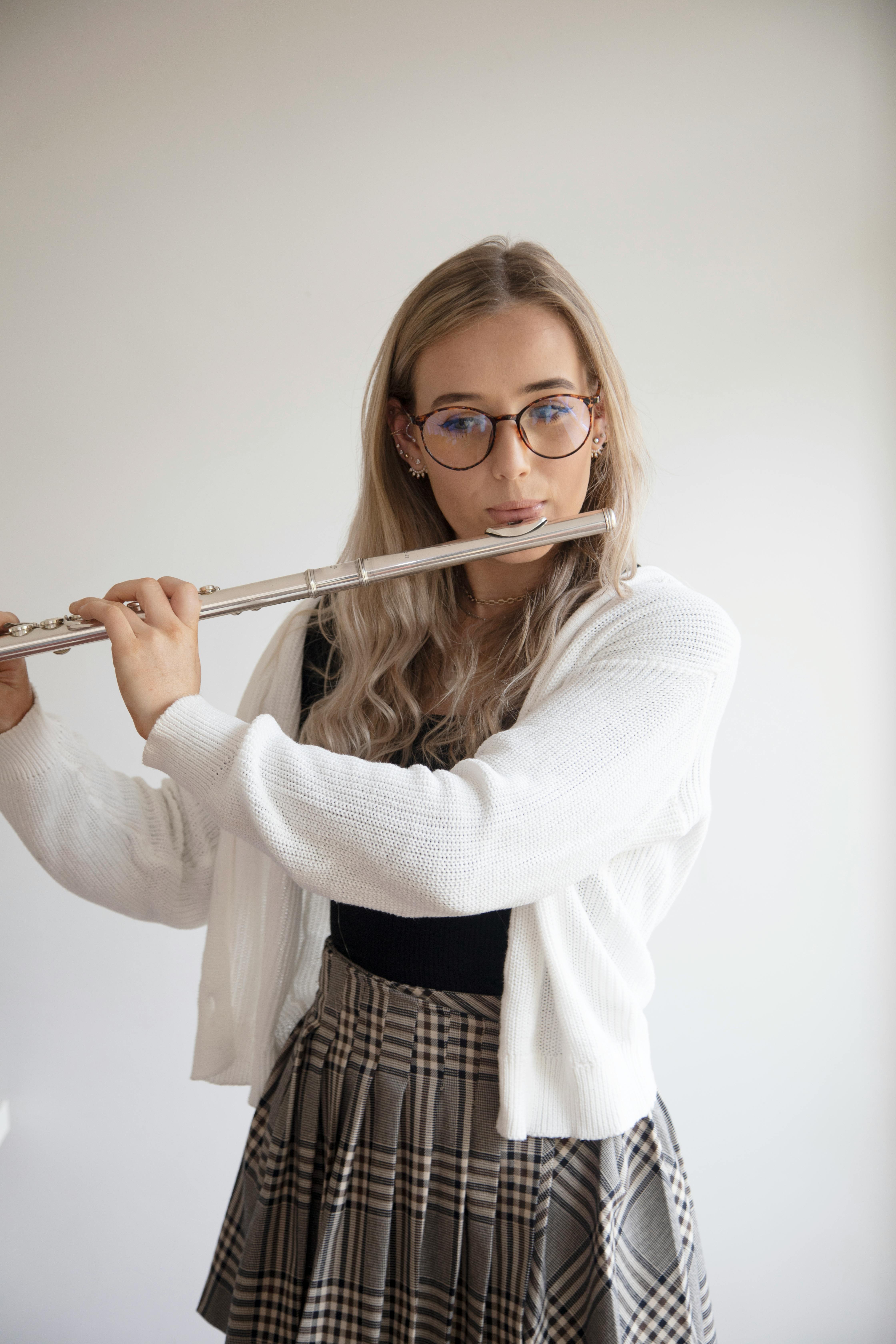 A Musician Playing the Flute · Free Stock Photo