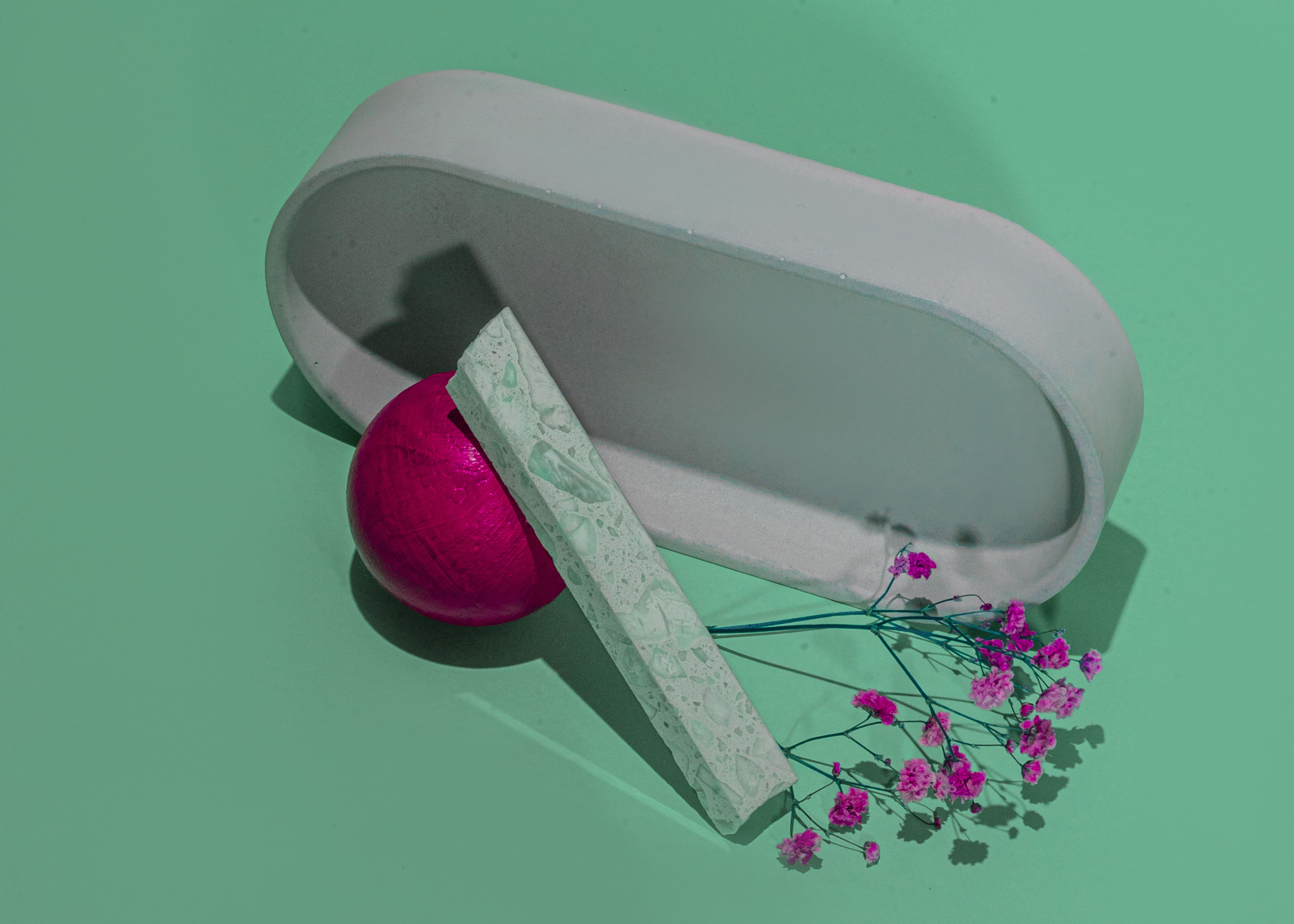 Close-up of a Composition of a Objects in Different Shapes and a Flower ...