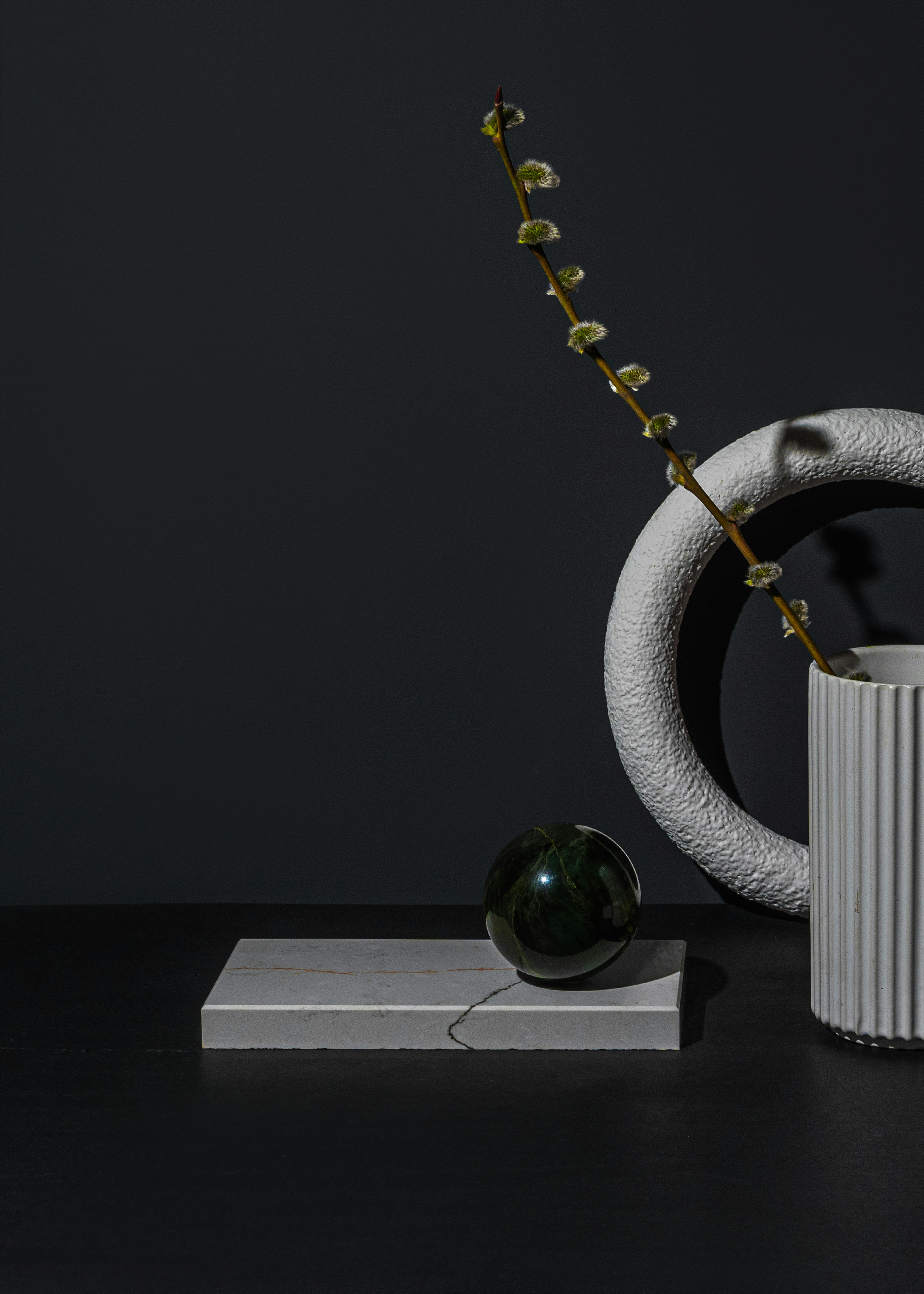 Contemporary Arrangement of Gray Objects in Different Shapes on Black ...