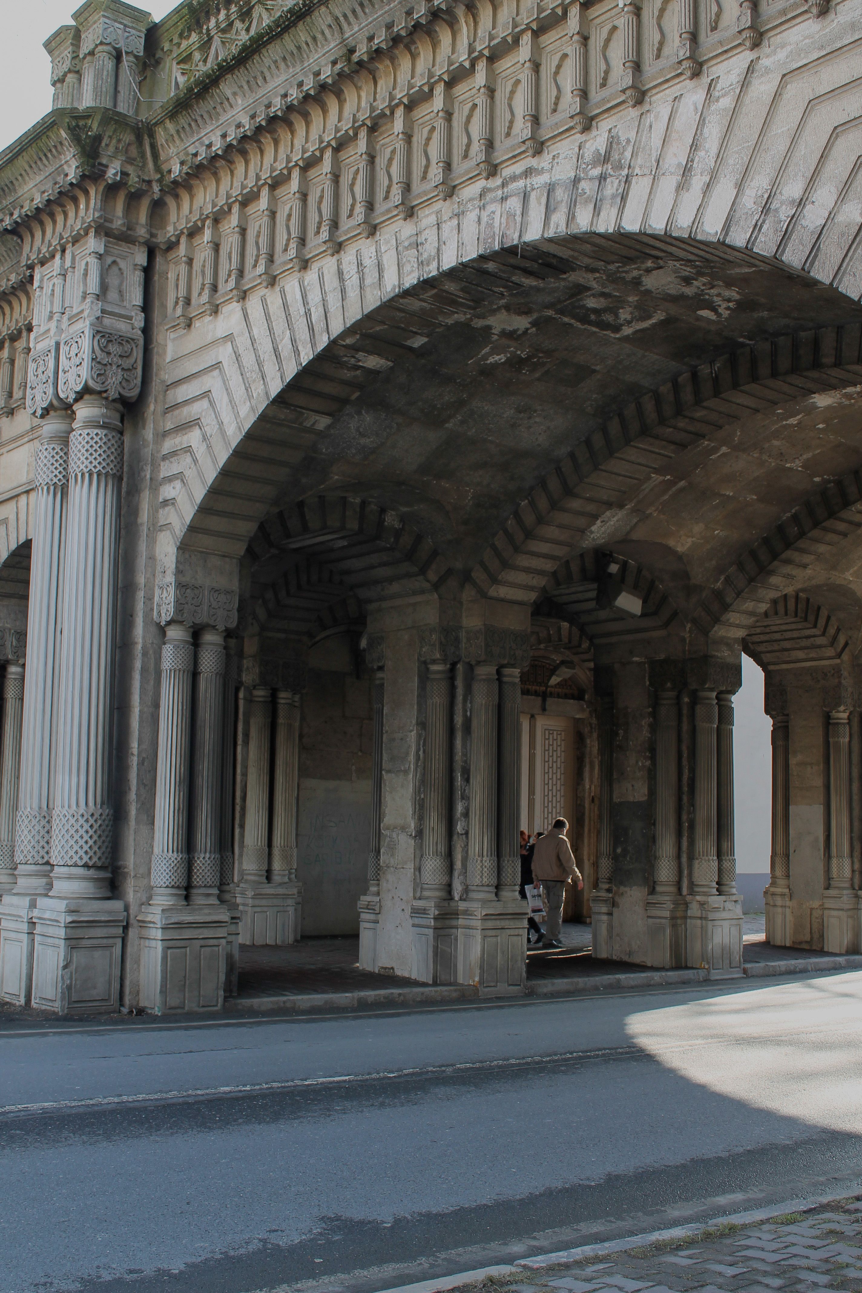 Arch with Columns over Street · Free Stock Photo