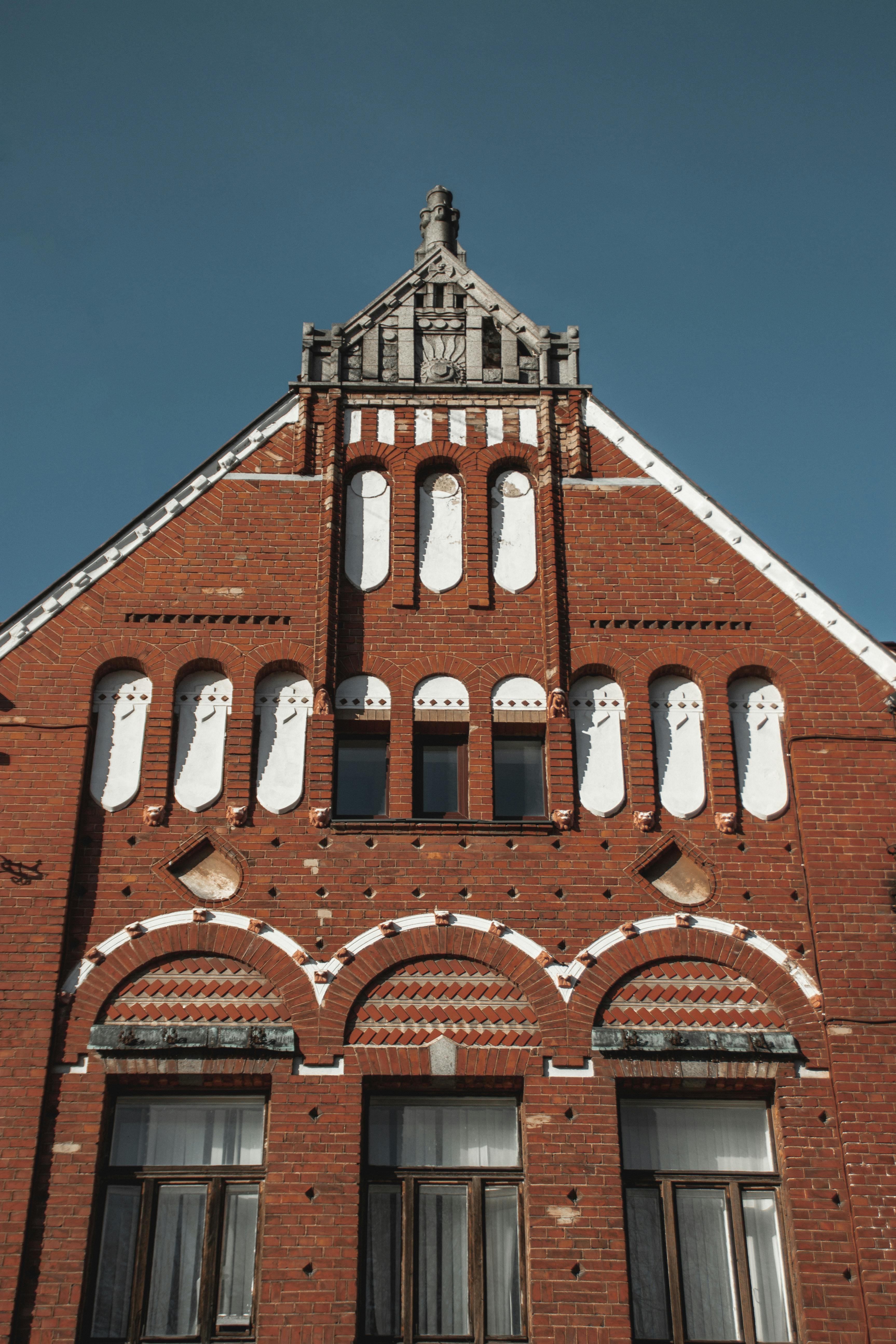 A Brown Concrete Building · Free Stock Photo