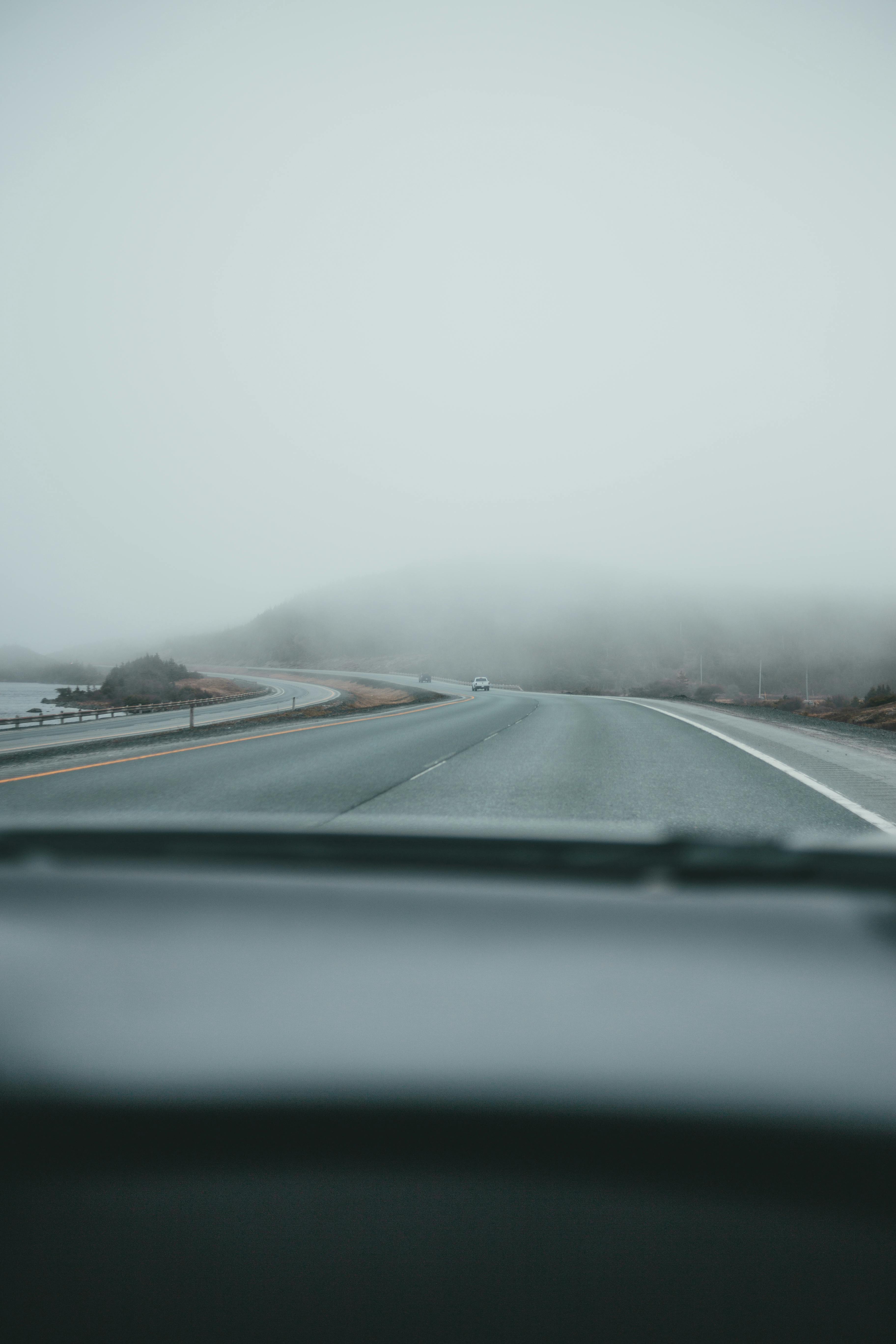 Driving on Highway under Fog · Free Stock Photo