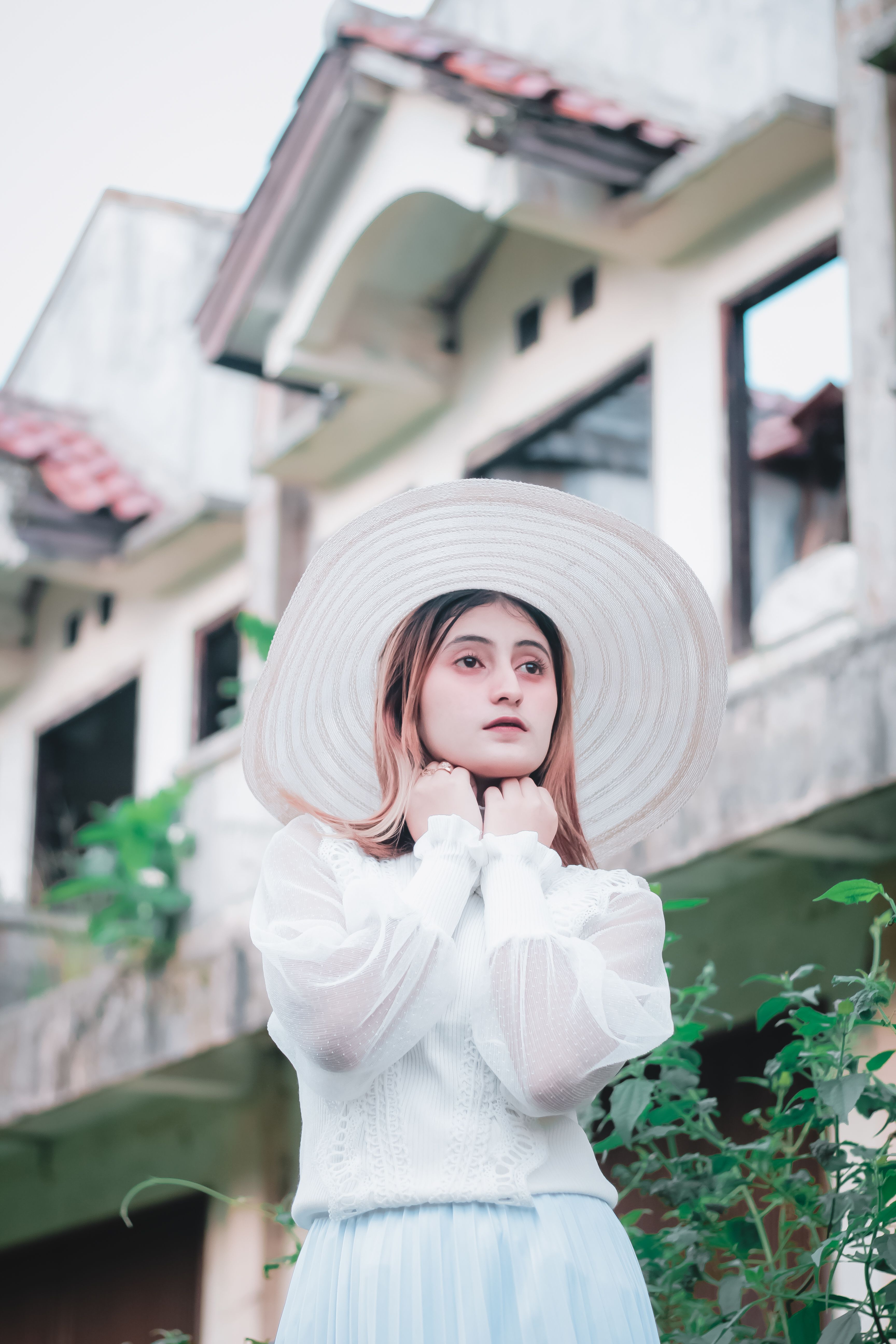 A Woman Wearing White Hat · Free Stock Photo