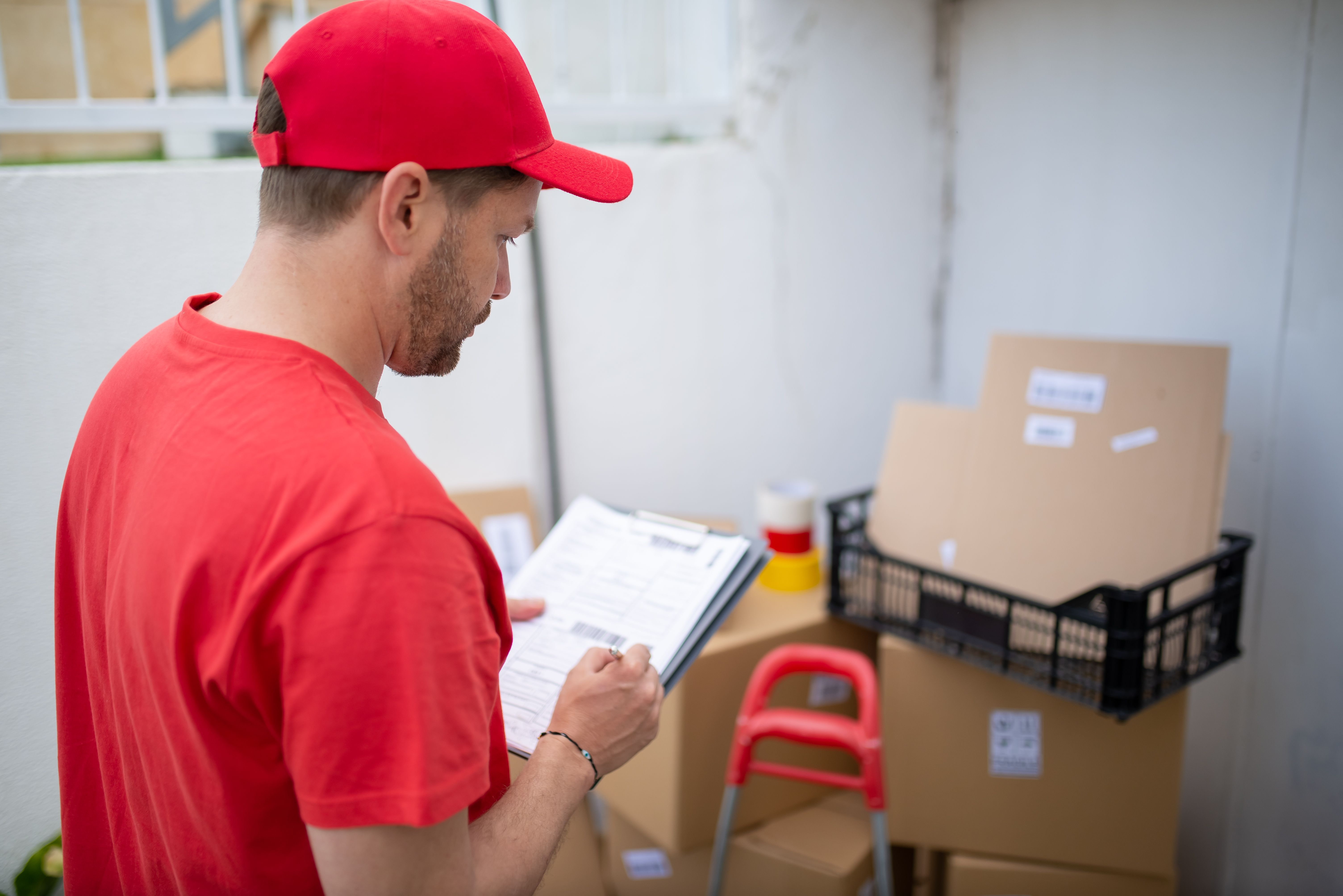 Red Delivery Man Photos, Download The BEST Free Red Delivery Man Stock ...
