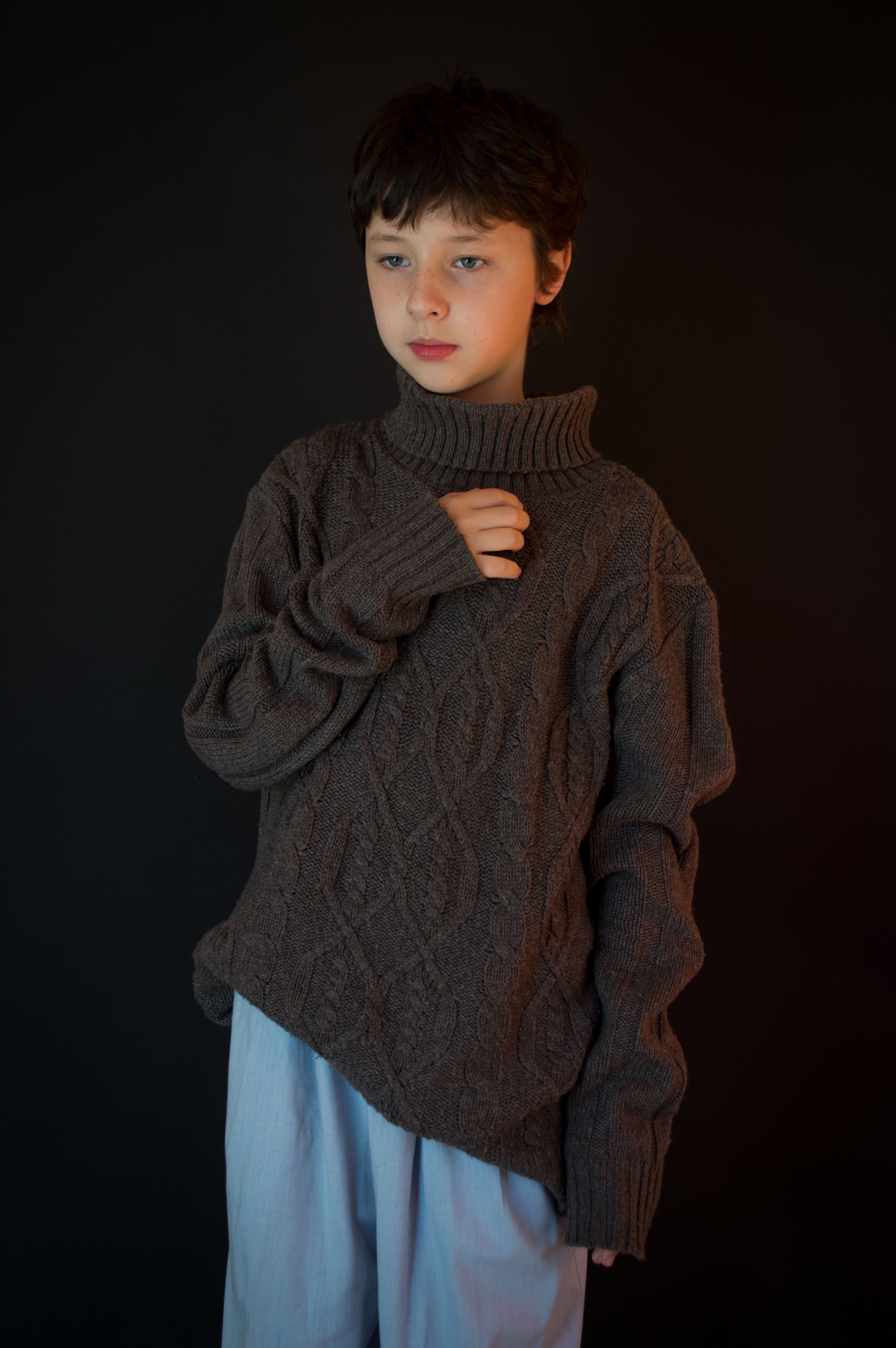 Boy in Oversized Black Knitwear and Blue Pants · Free Stock Photo