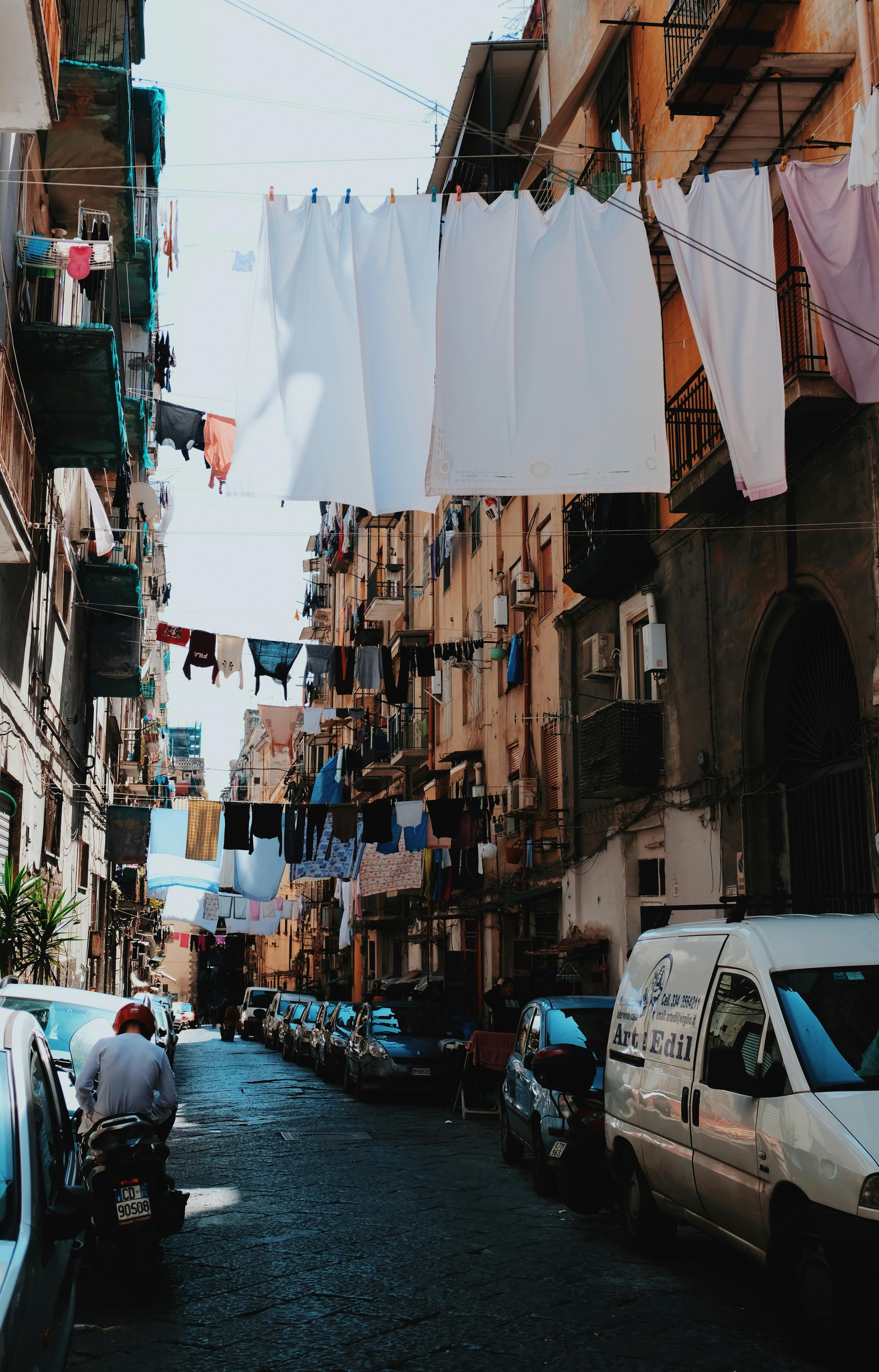 A Street with Hanged Laundry · Free Stock Photo