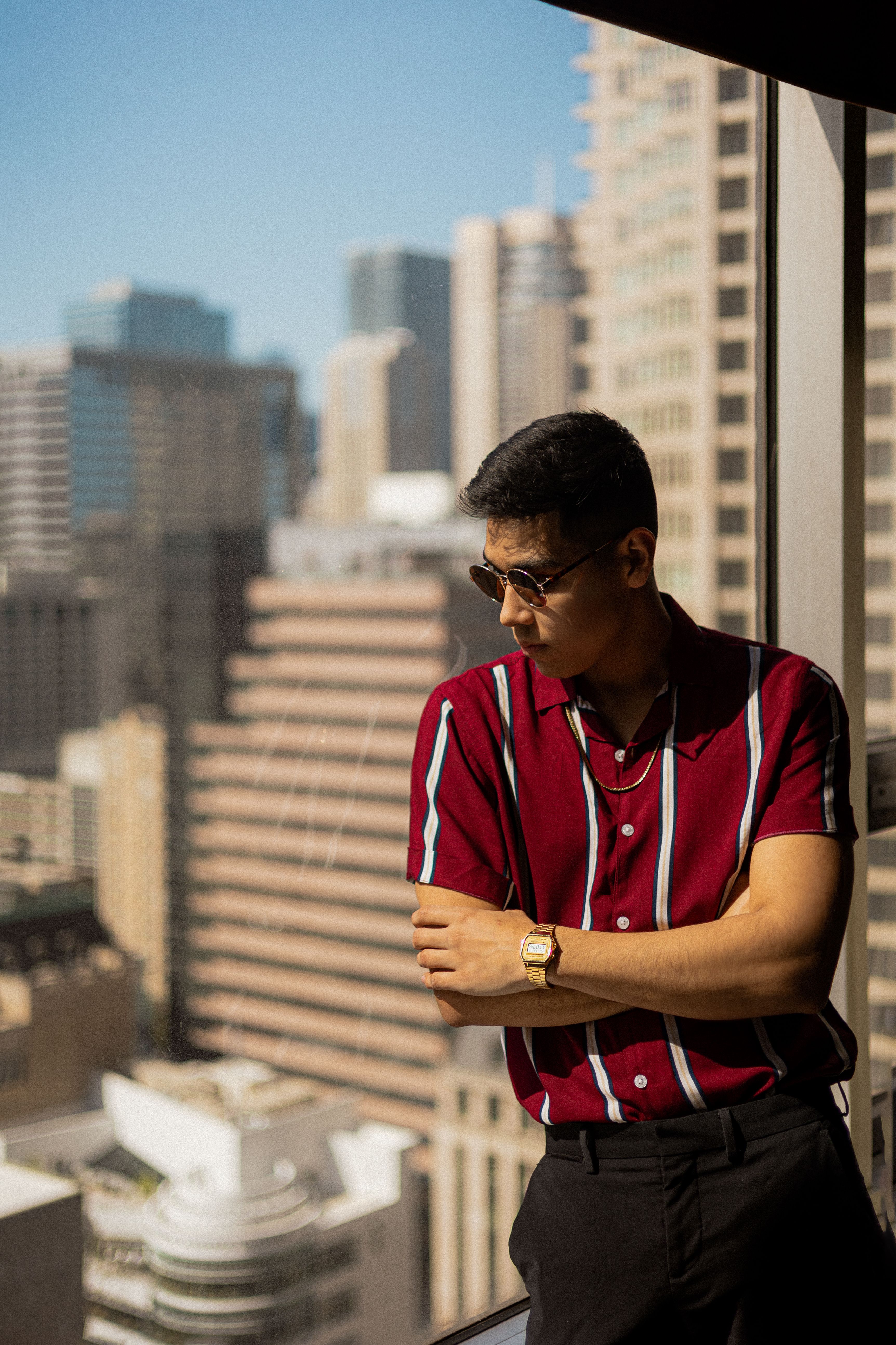 Man Leaning on a Glass Window · Free Stock Photo