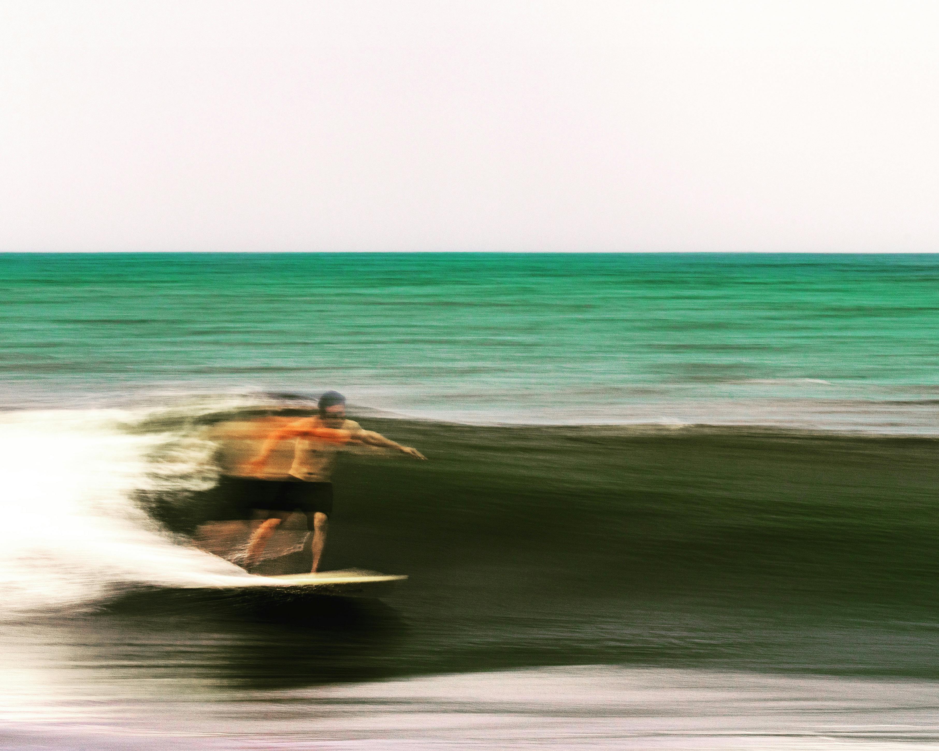 Man Surfing on the Ocean · Free Stock Photo