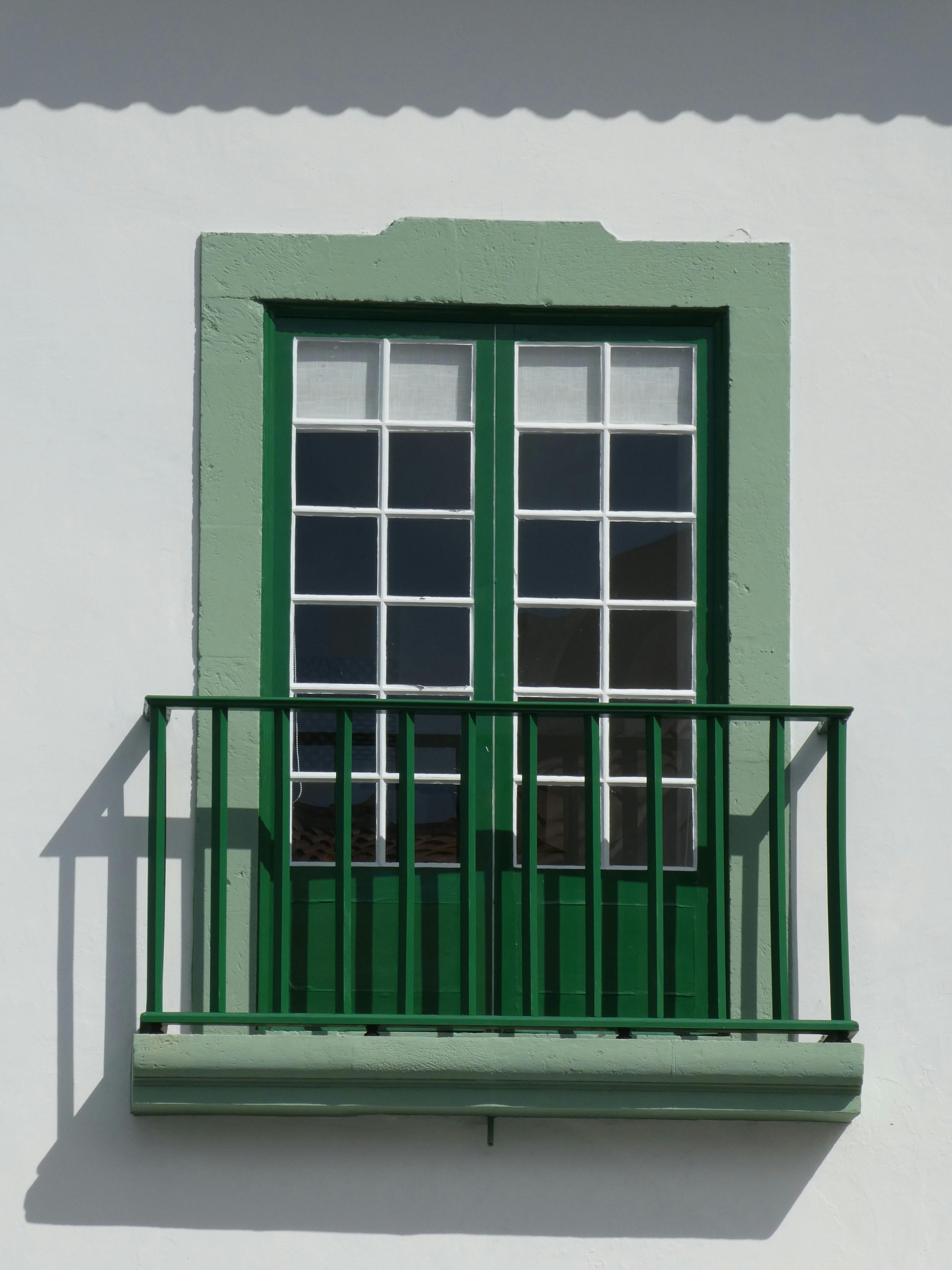 Green Wooden Window Frame on White Wall · Free Stock Photo