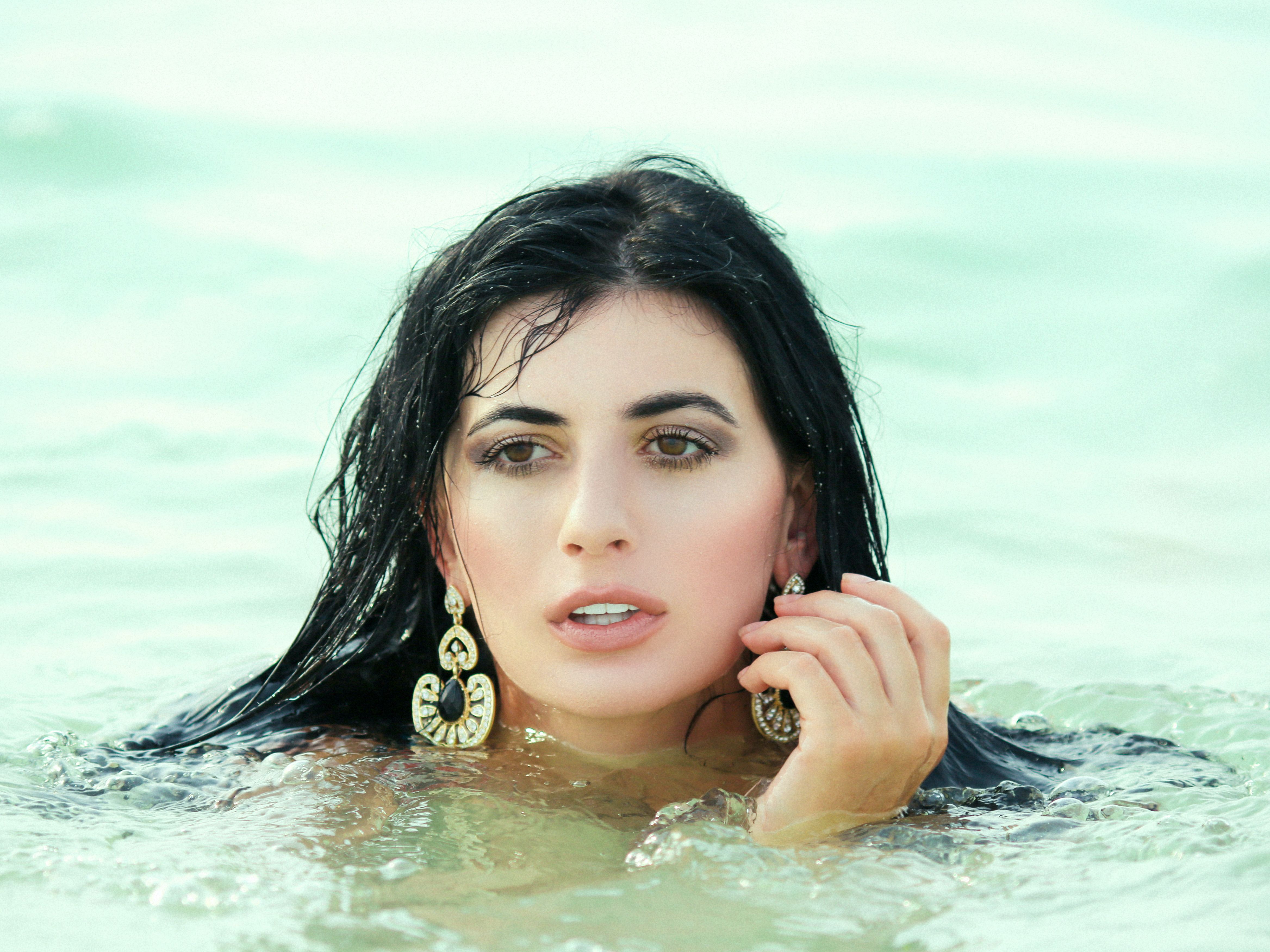 Portrait of Beautiful Woman Swimming in Pool · Free Stock Photo