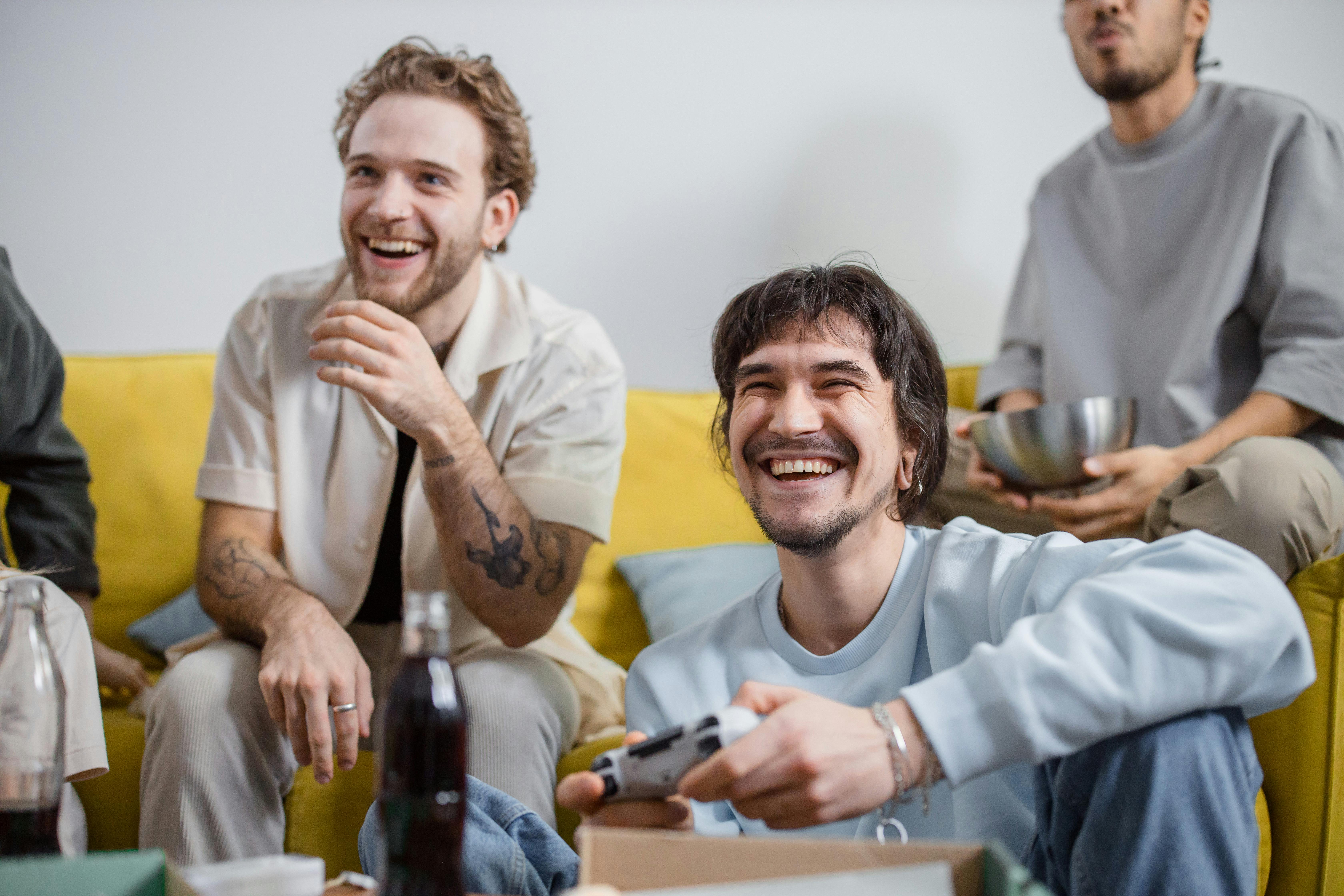 Men Playing Games Together · Free Stock Photo