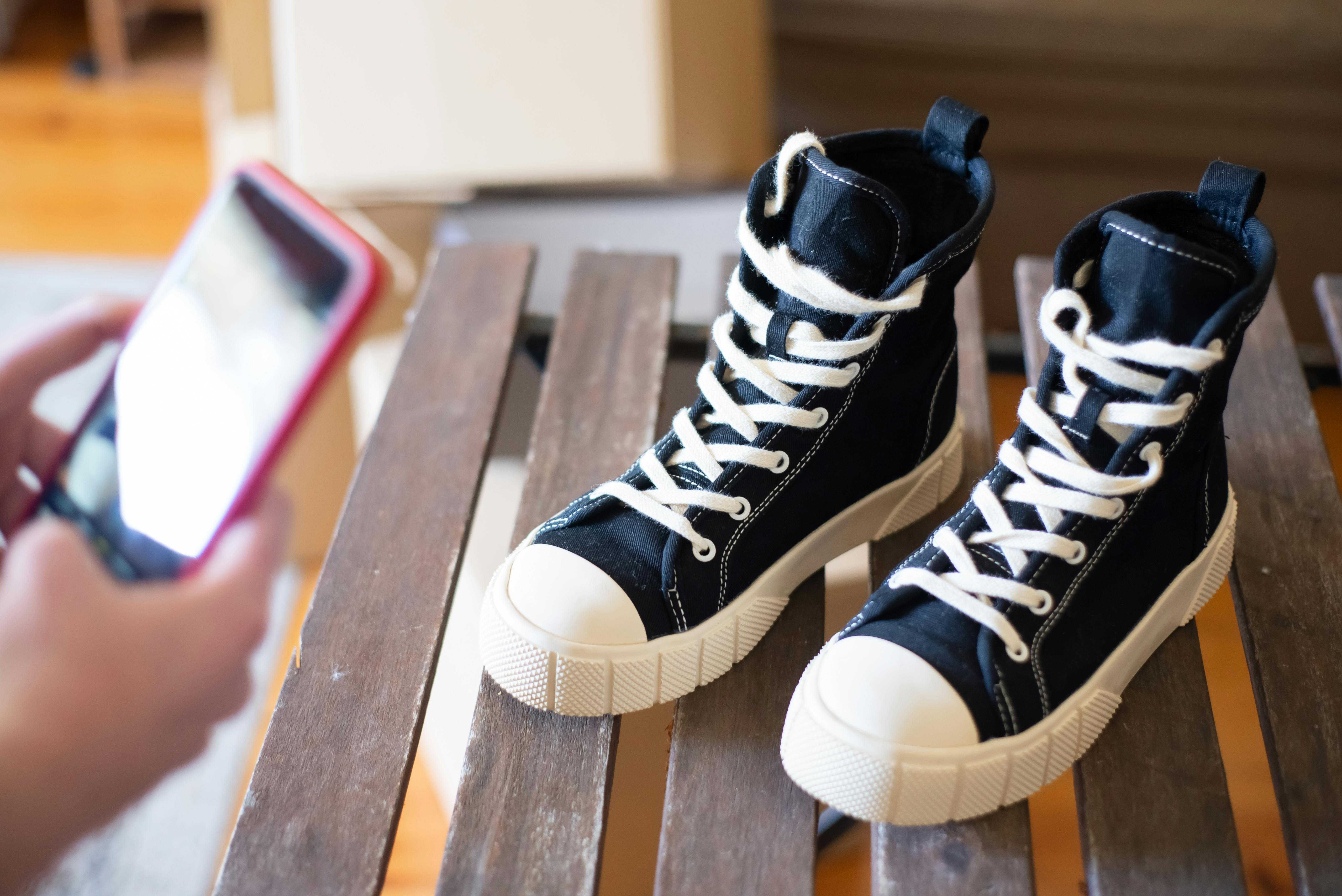 Person Tying Her Shoes · Free Stock Photo