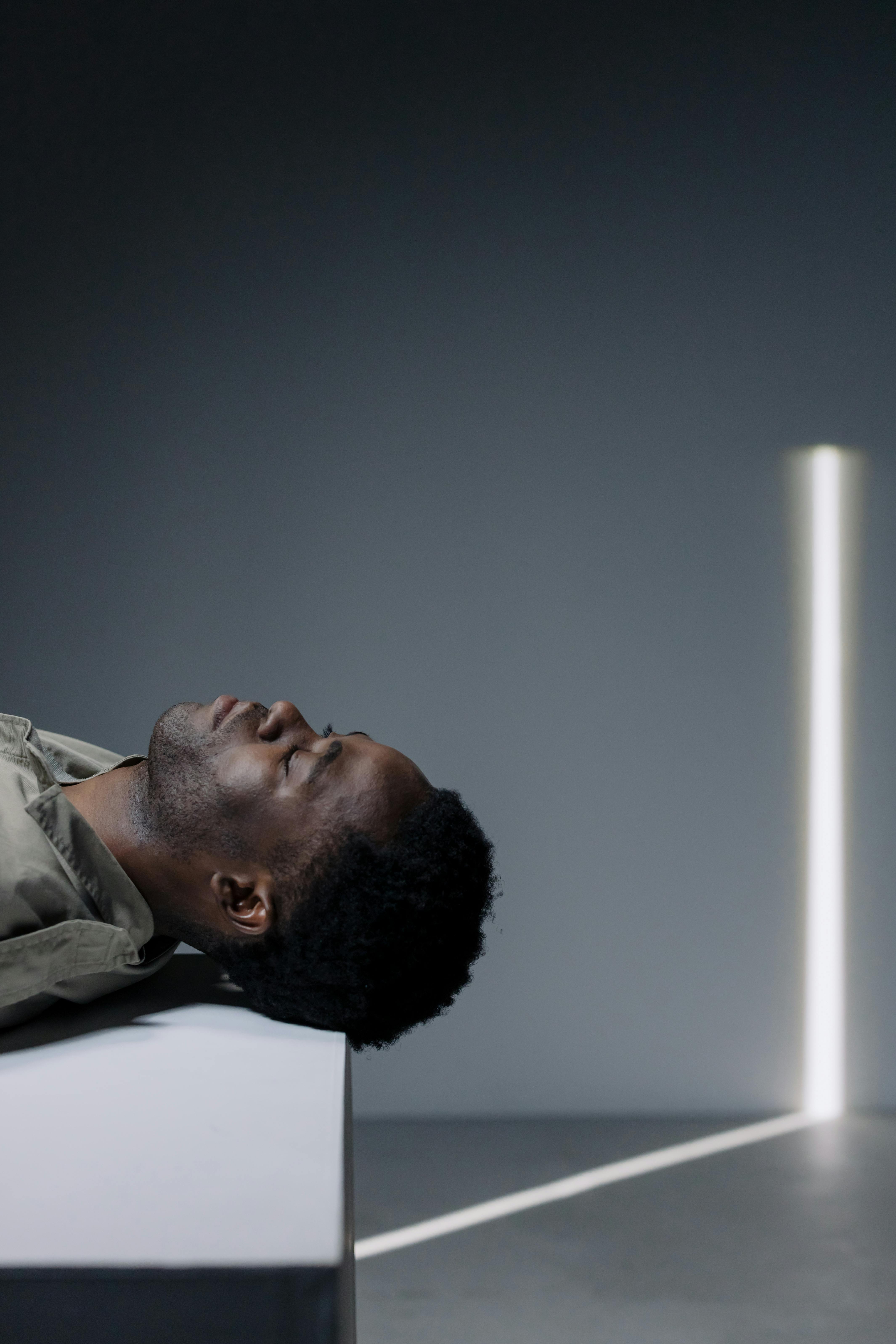 Man Lying on the Table · Free Stock Photo