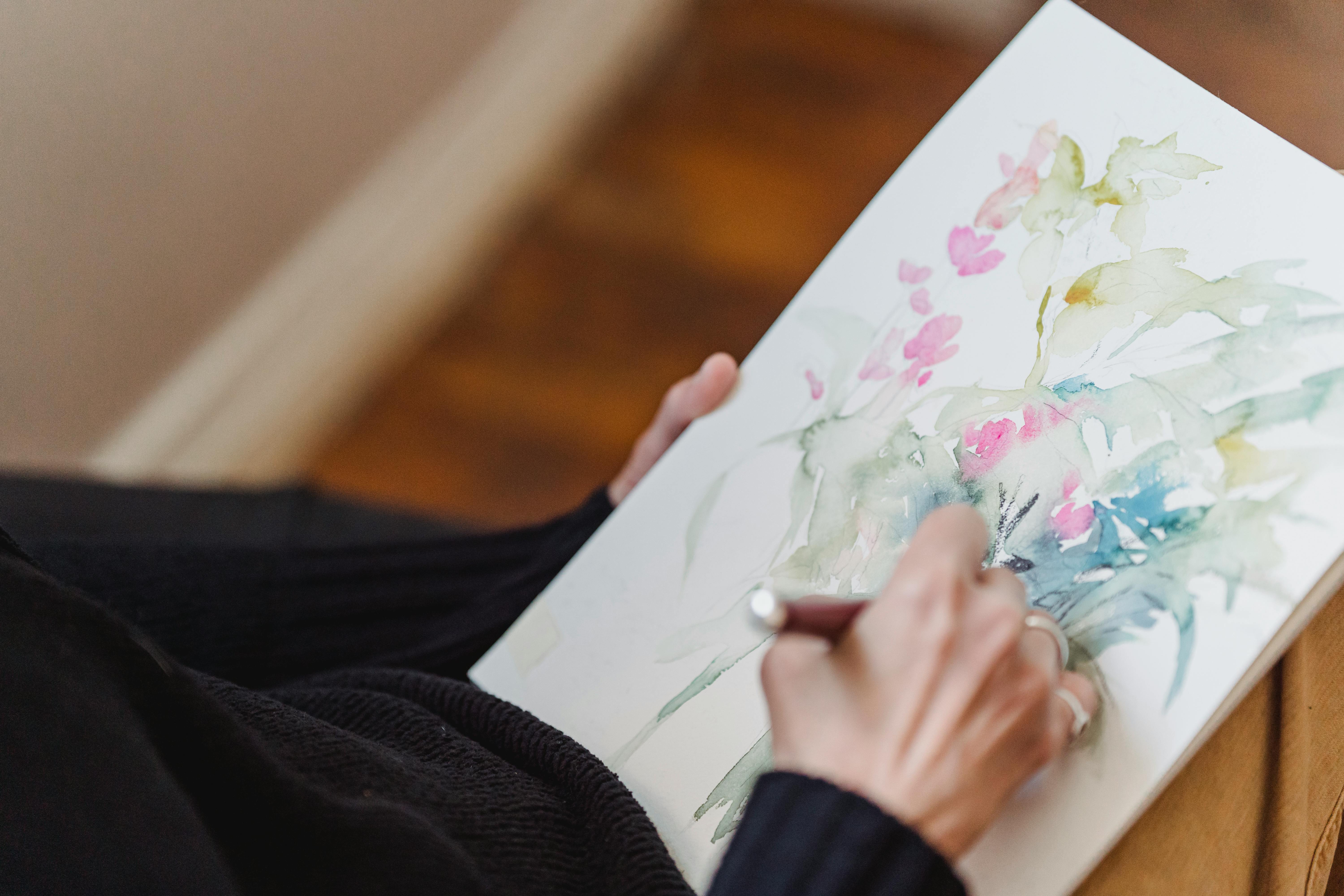 Person Drawing an Artwork · Free Stock Photo