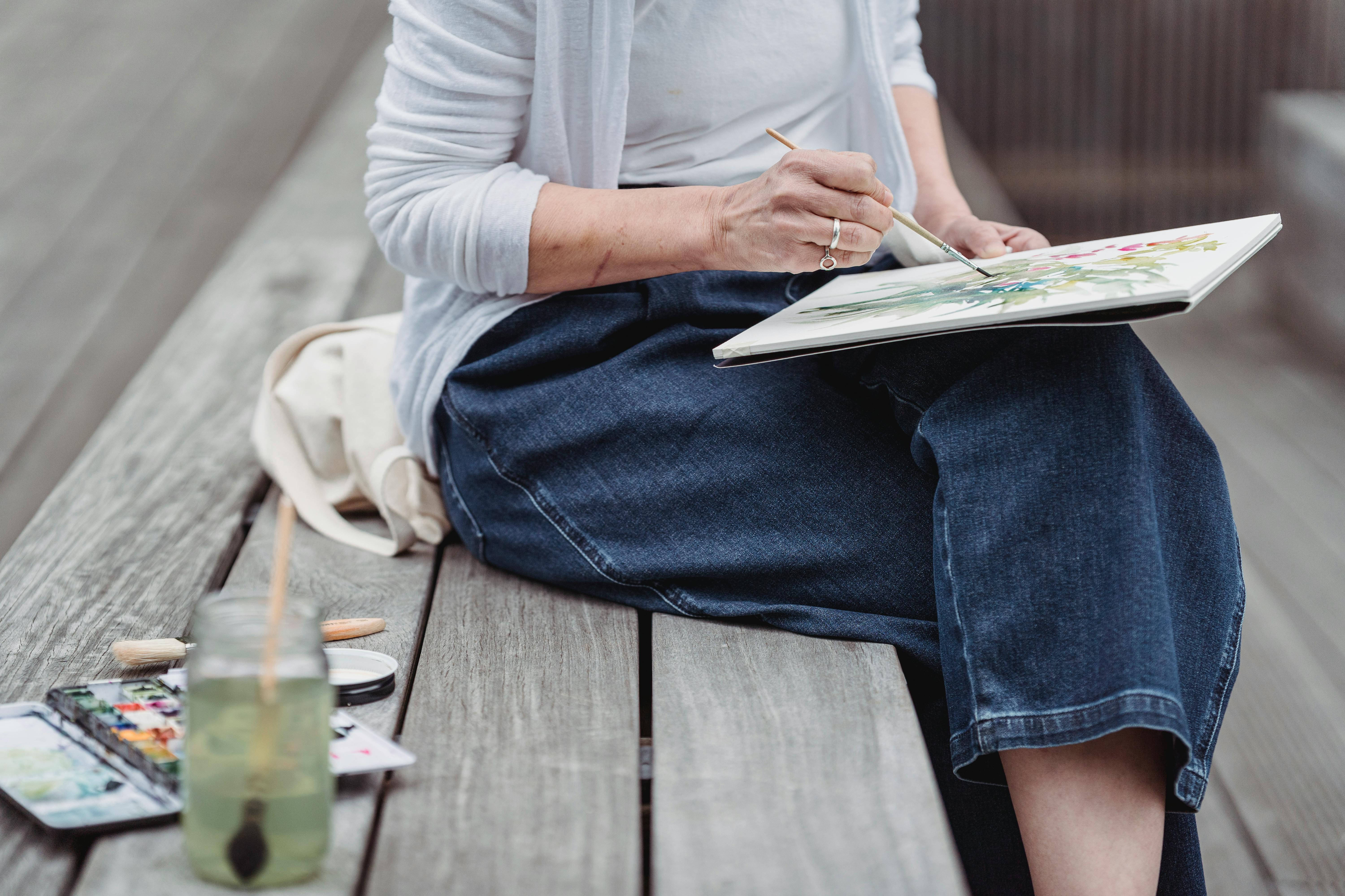 Person Painting an Artwork · Free Stock Photo