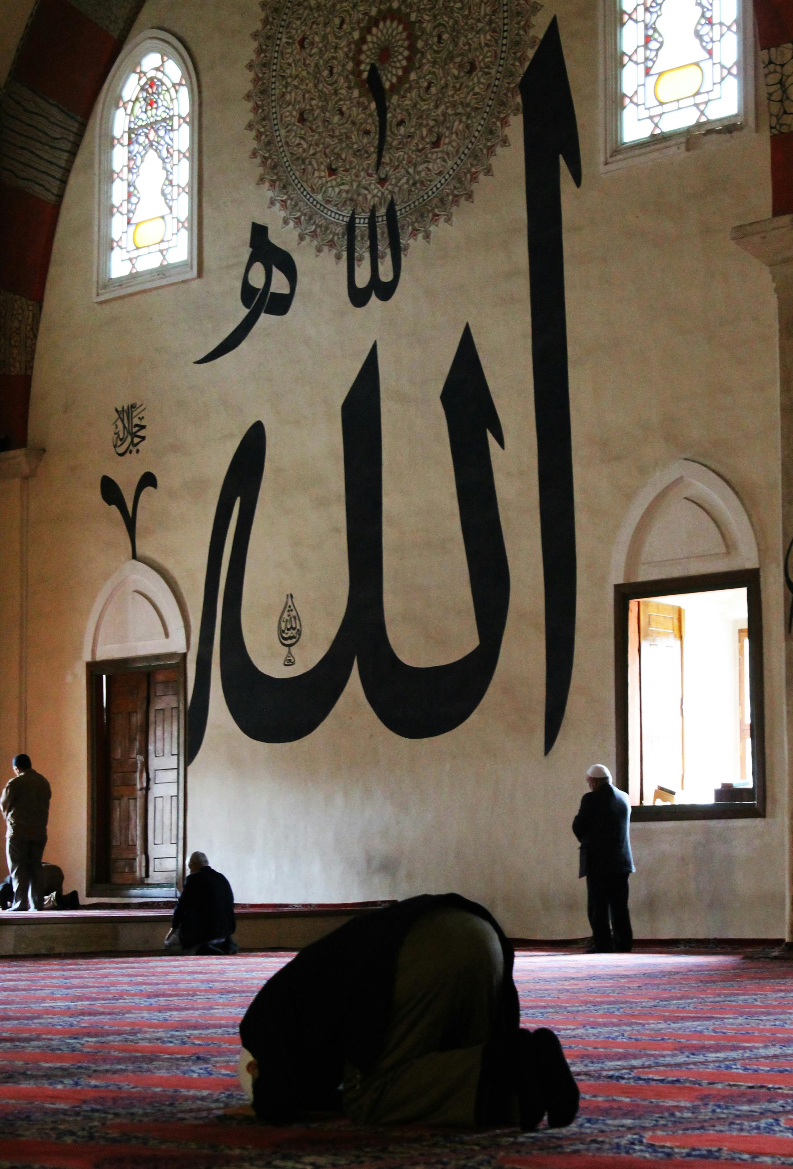 Man Praying in Mosque · Free Stock Photo