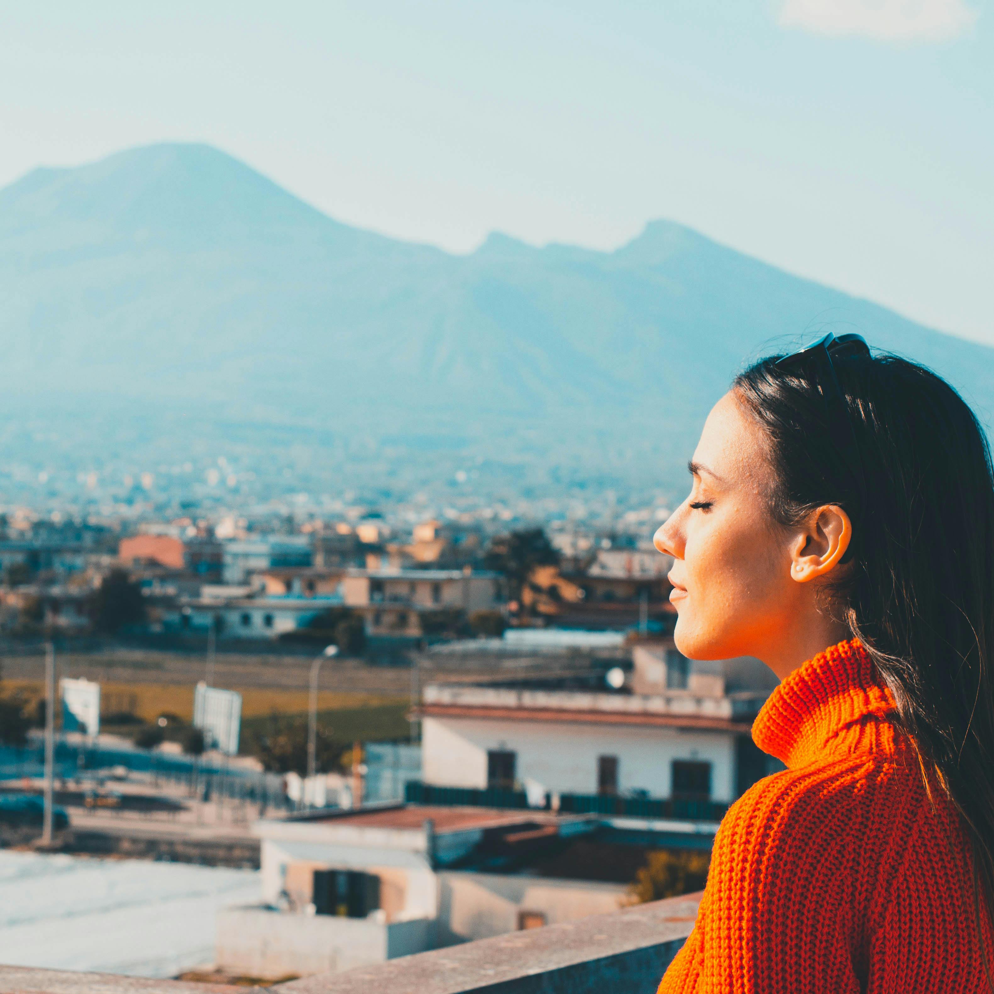 Portrait of Woman Standing on Rooftop · Free Stock Photo
