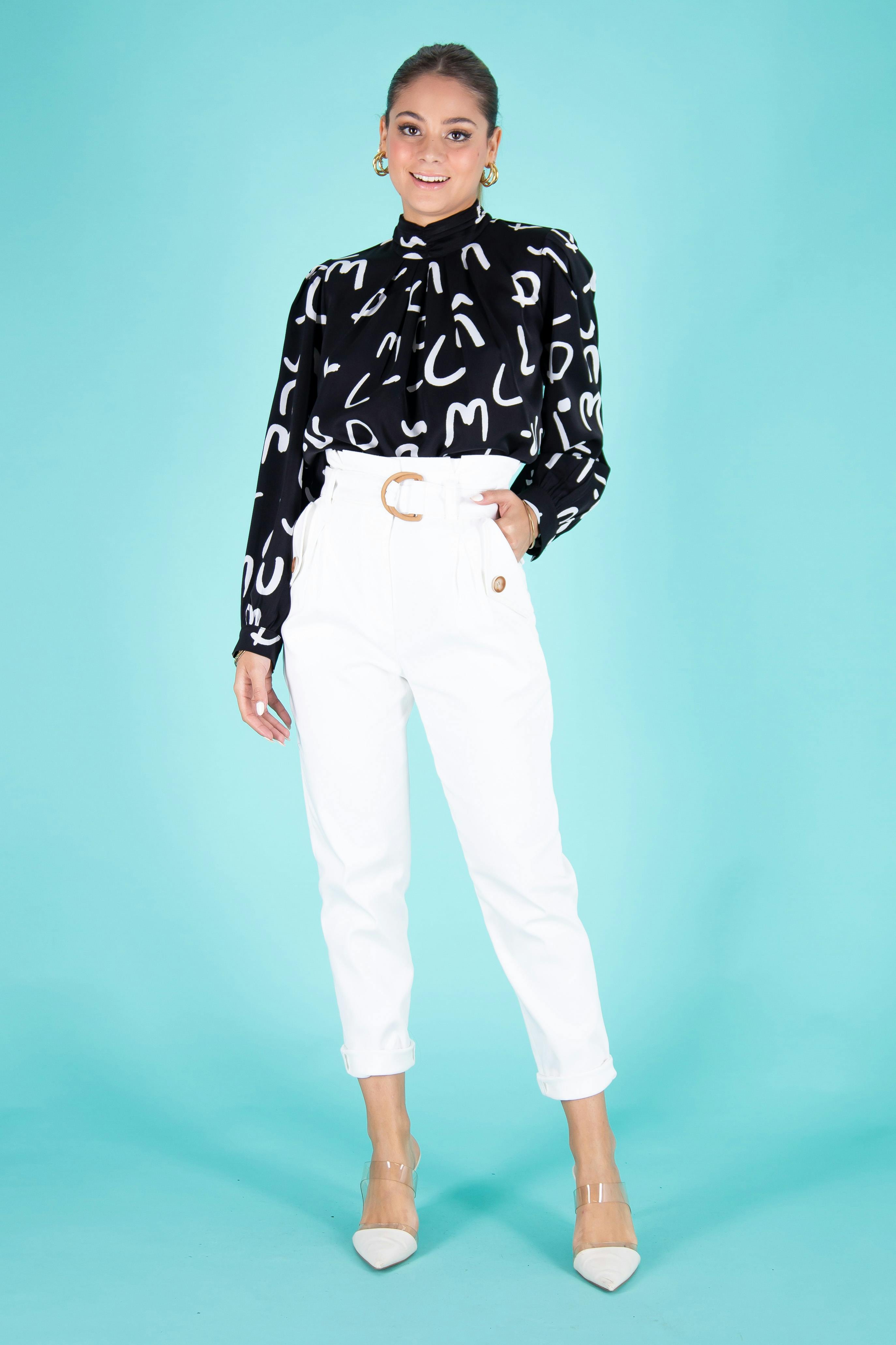 Fashionable Woman on Light Blue Background · Free Stock Photo