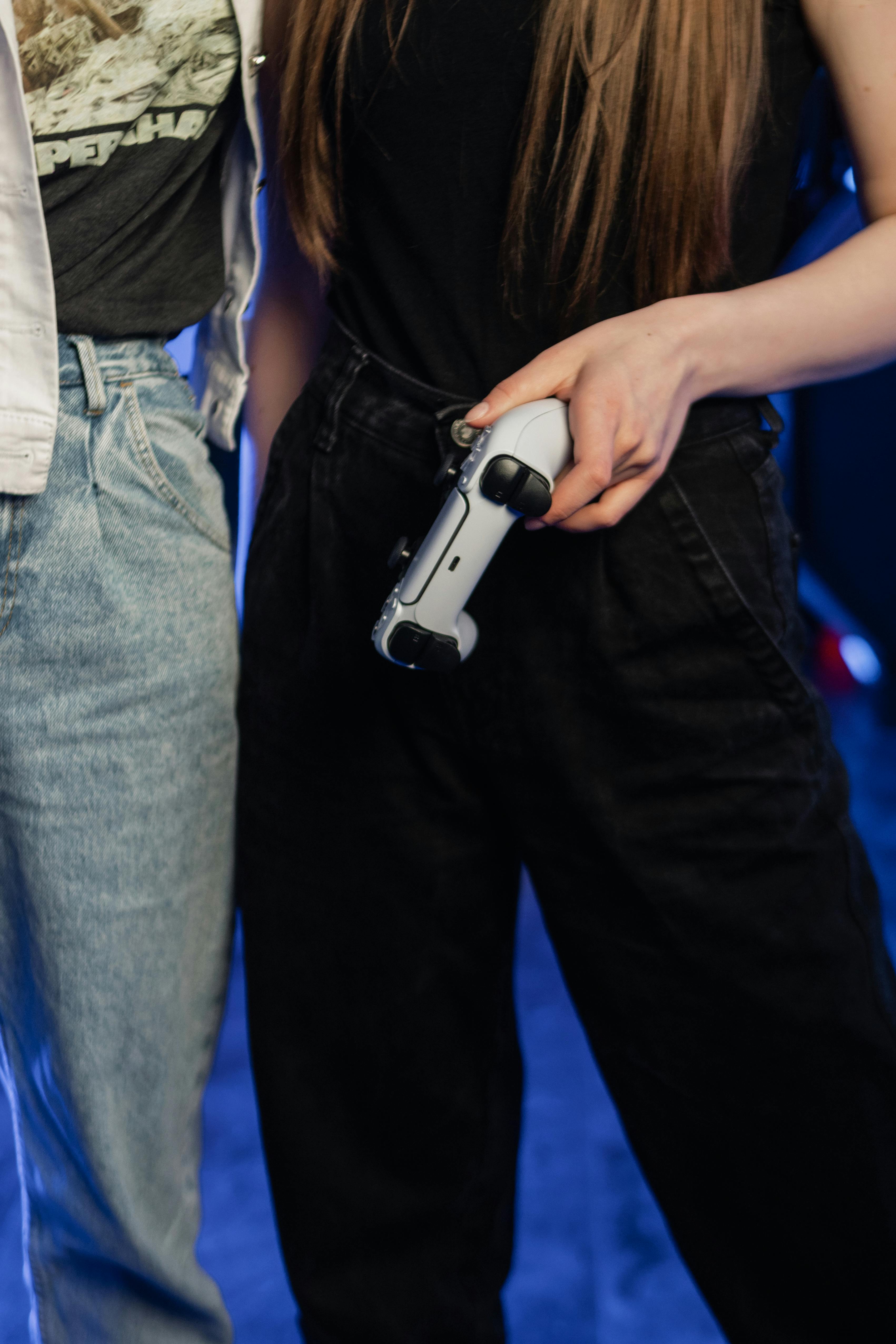 Woman Holding a Video Game Controller · Free Stock Photo