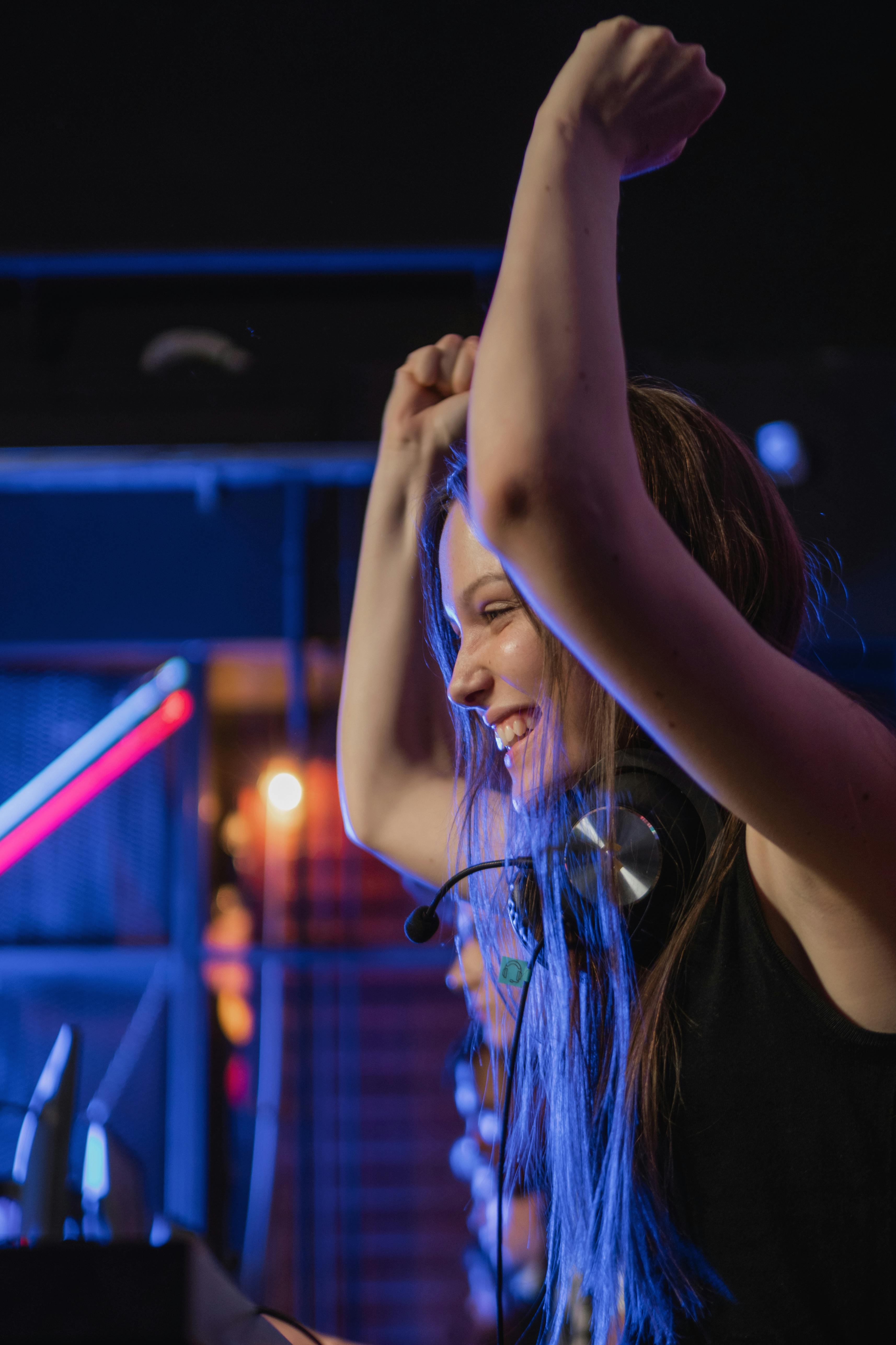 A Boy Raising His Hands while Gaming · Free Stock Photo