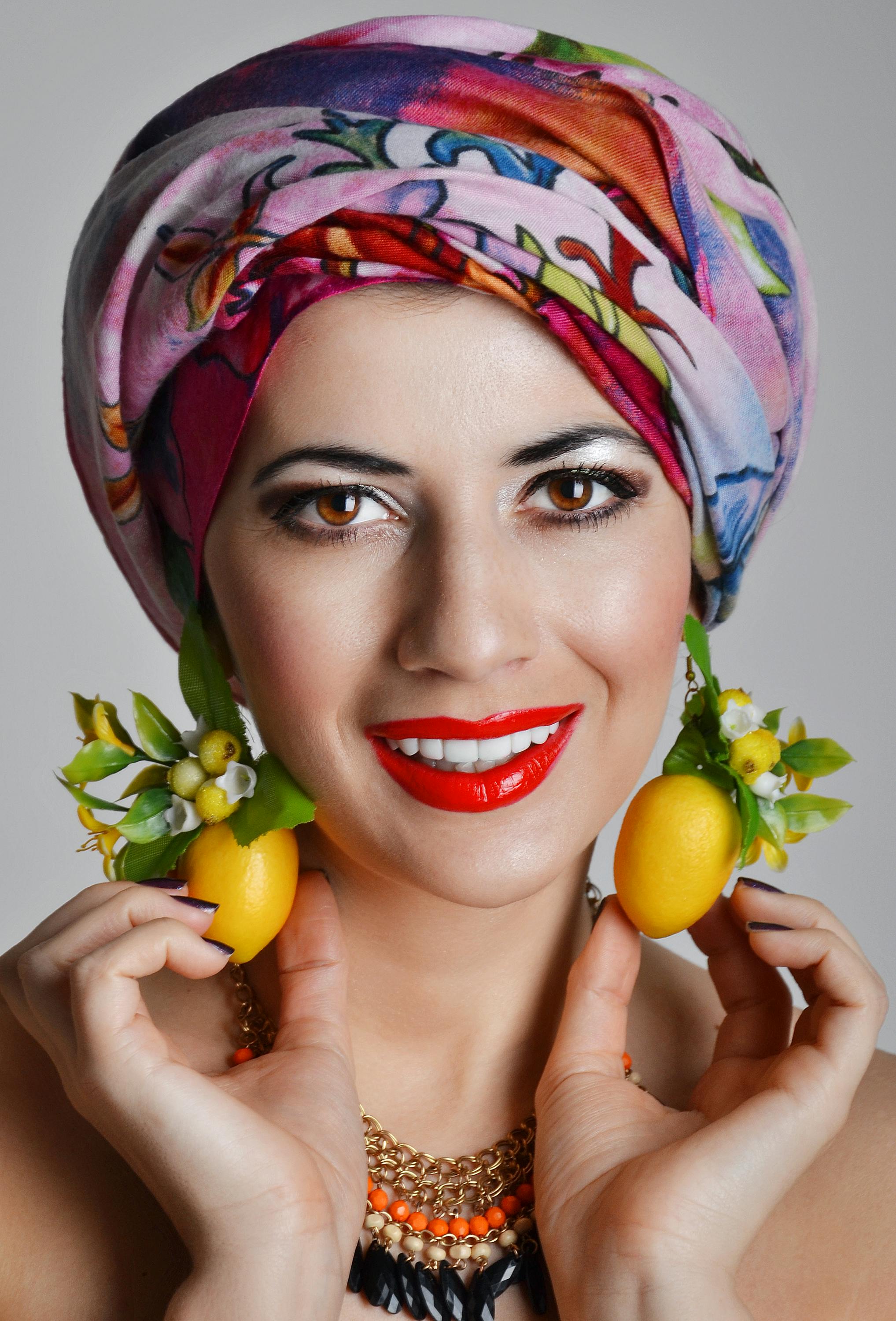 Woman in Peach and White Top While Taking Selfie · Free Stock Photo