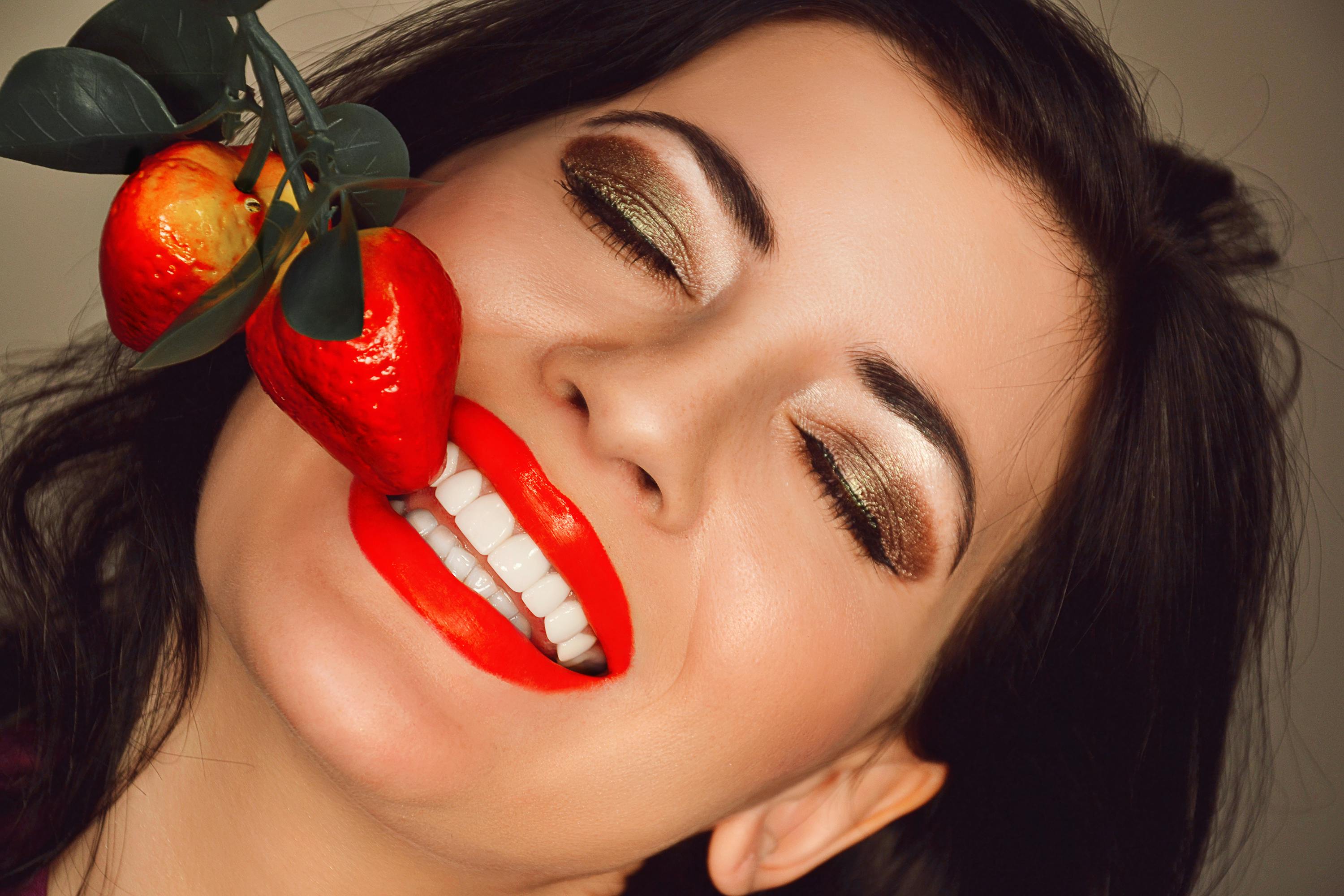 Close up Portrait of Woman with Gold and Red Makeup with Artificial ...
