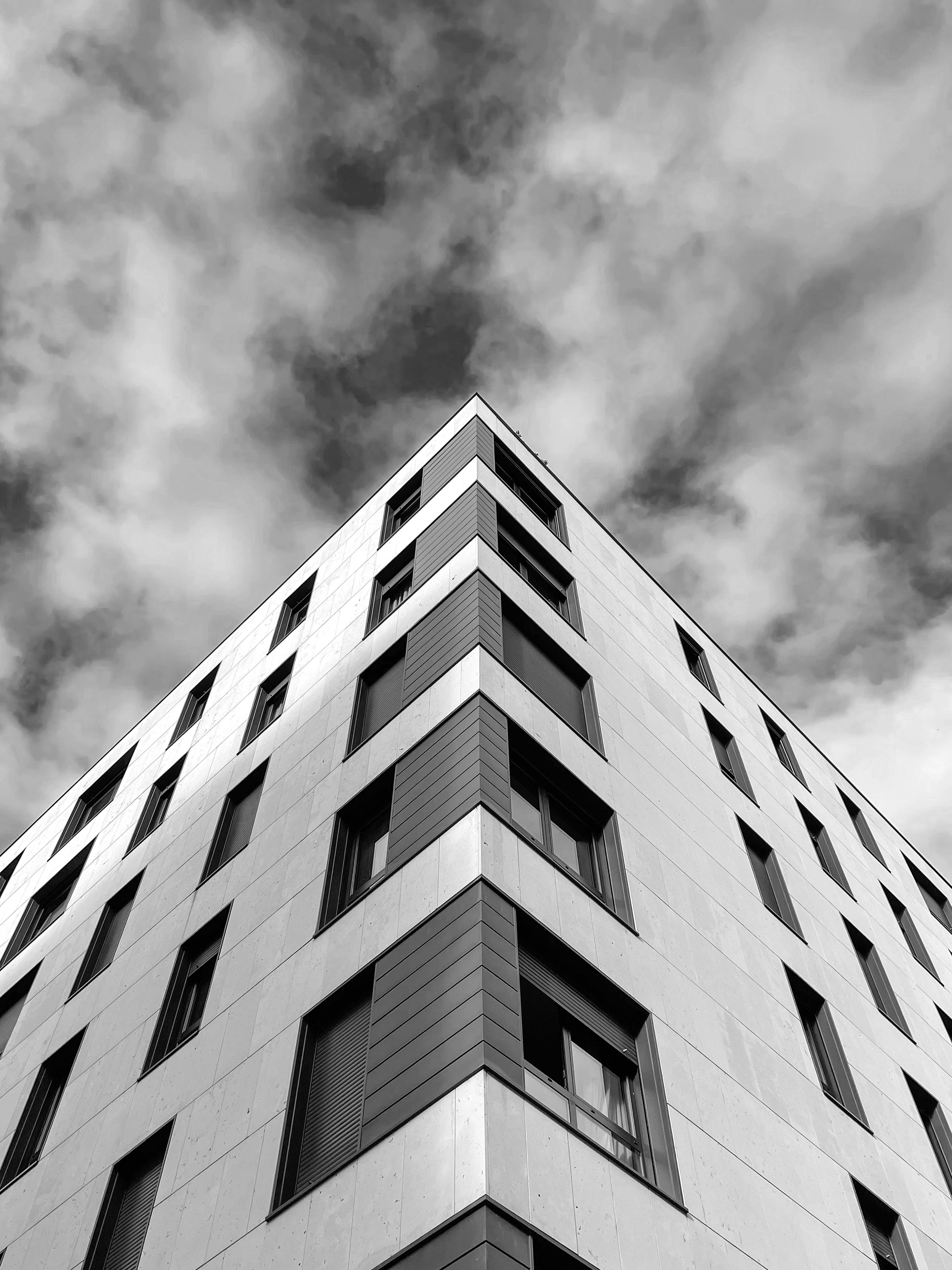 Grayscale Photo of Concrete Building · Free Stock Photo