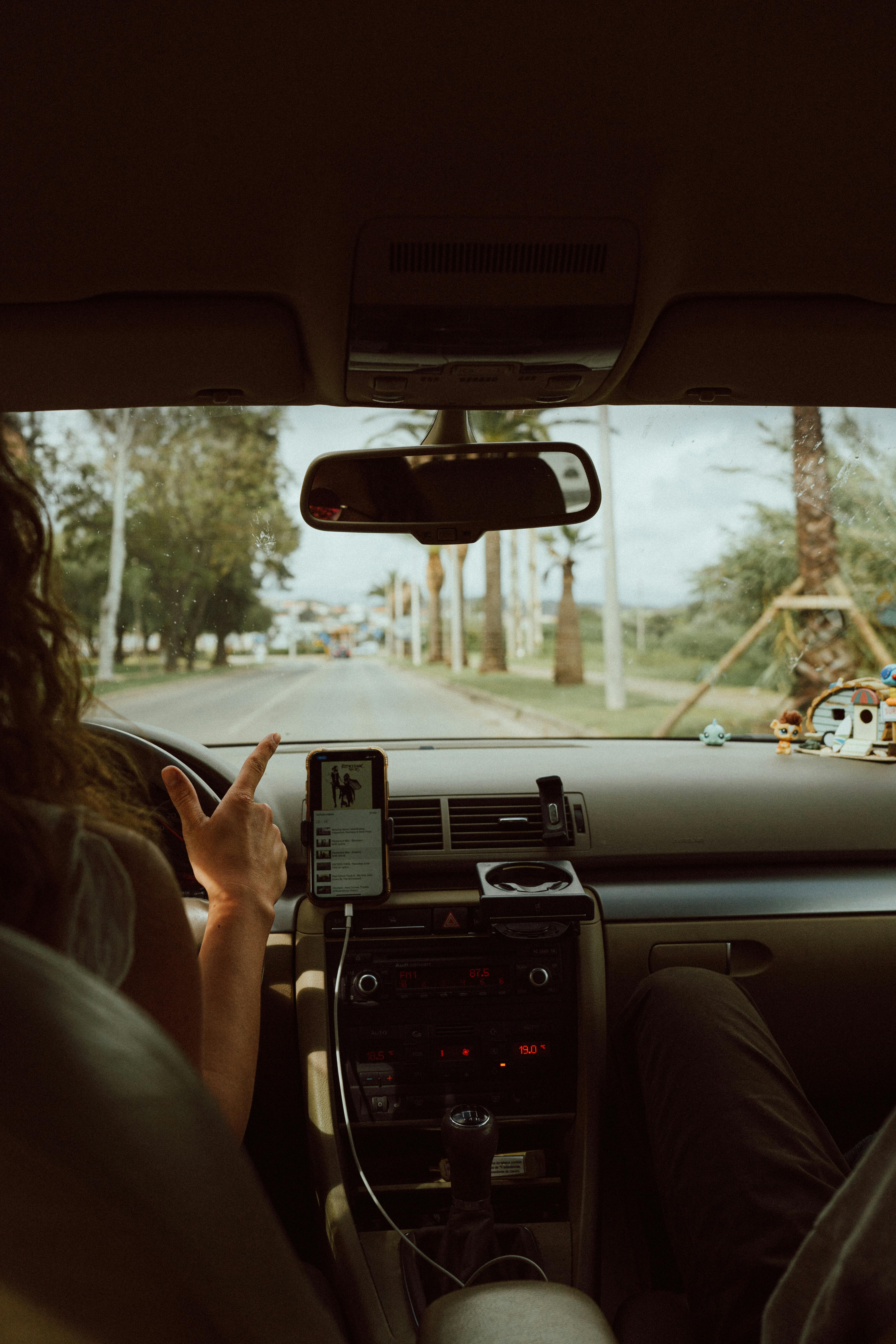 A Person Driving a Car · Free Stock Photo