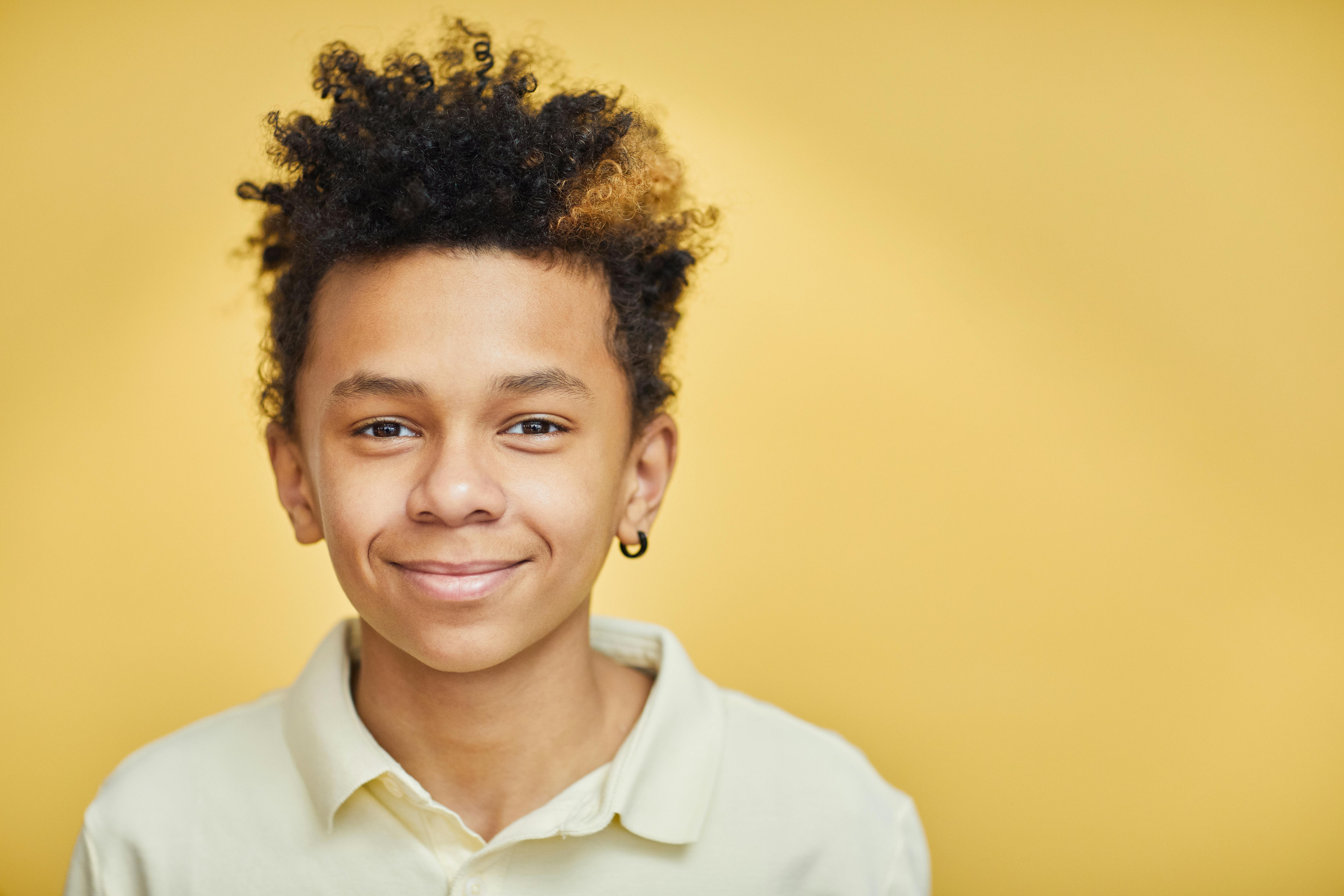 A Fine Looking Boy with Loop Earing · Free Stock Photo