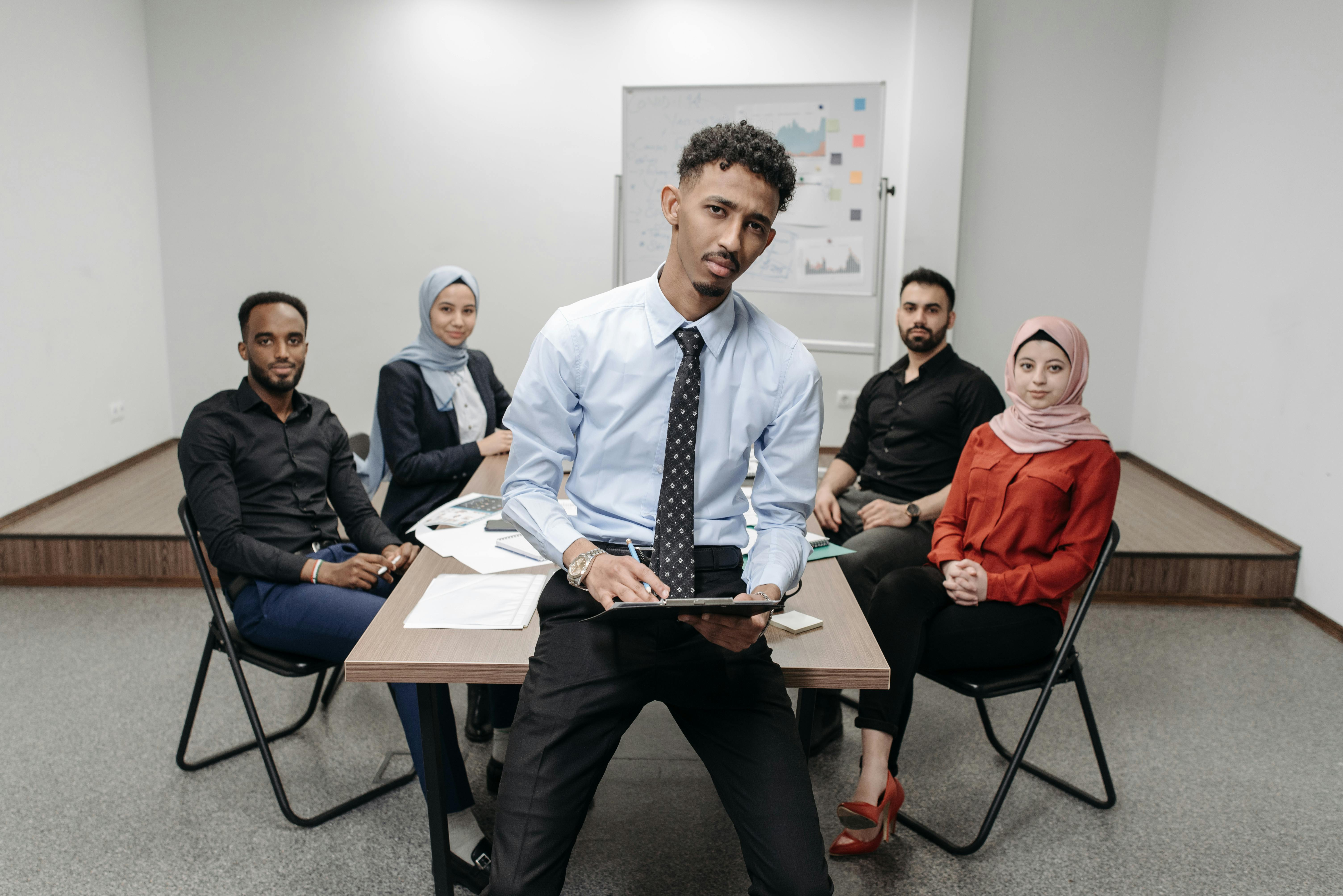 Group of People Sitting on Chair · Free Stock Photo