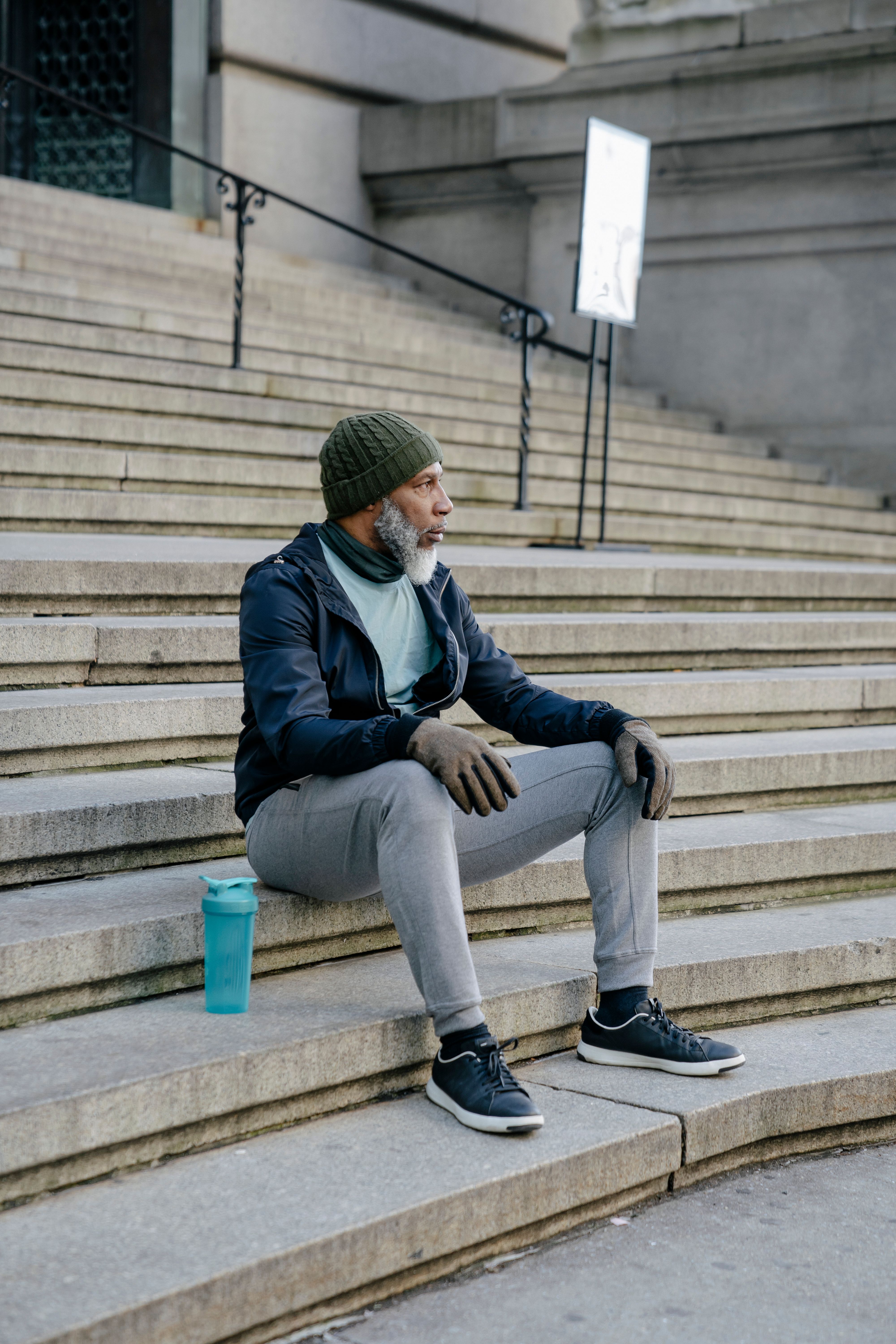 A Man Sitting on the Stairs · Free Stock Photo